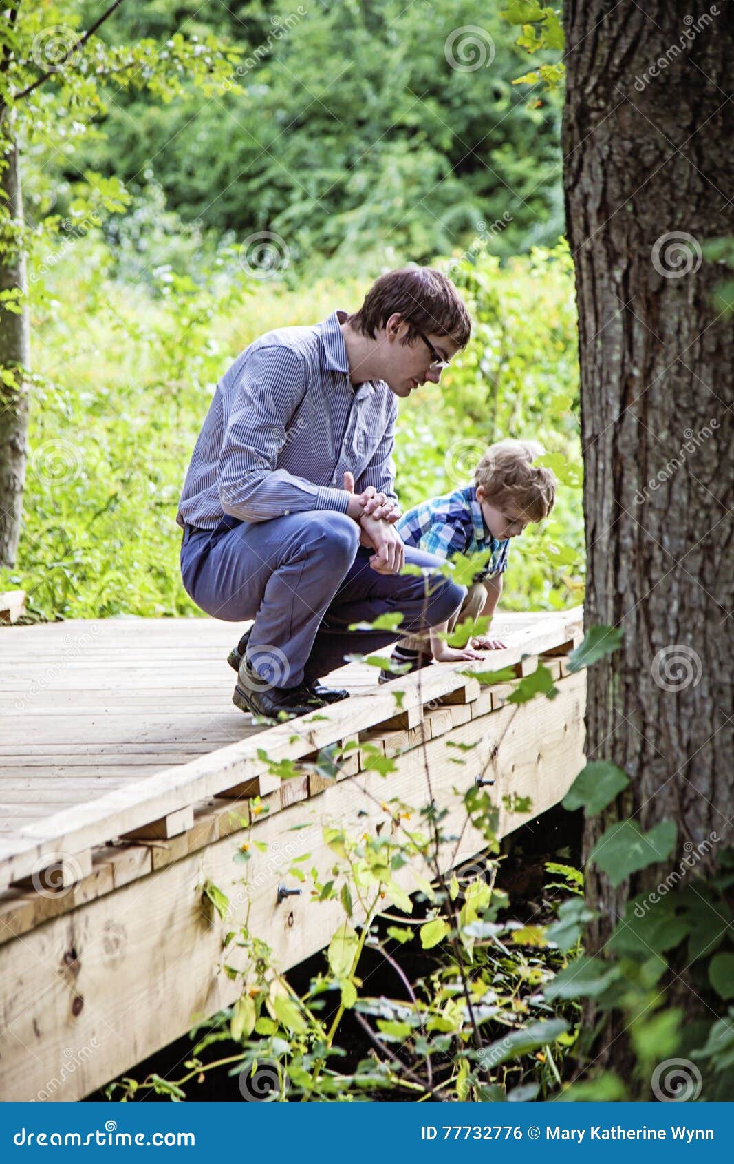 Father and Son Exploring Nature Stock Photo - Image of play, casual ...