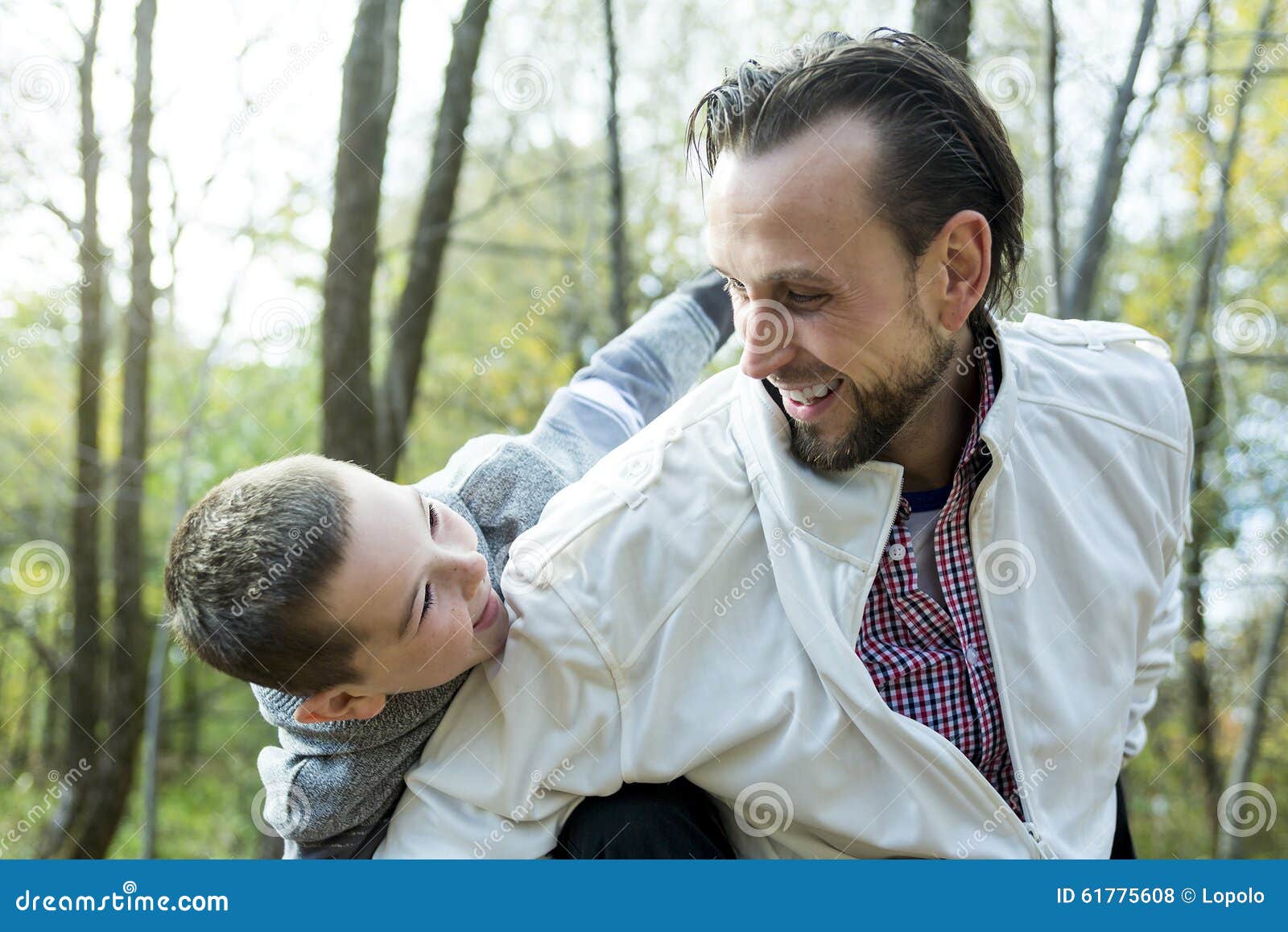 Father and son fall stock photo. Image of holding, autumn - 61775608