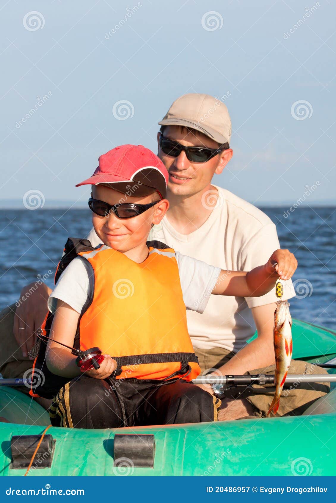 Father and son fish stock image. Image of people, fish - 20486957