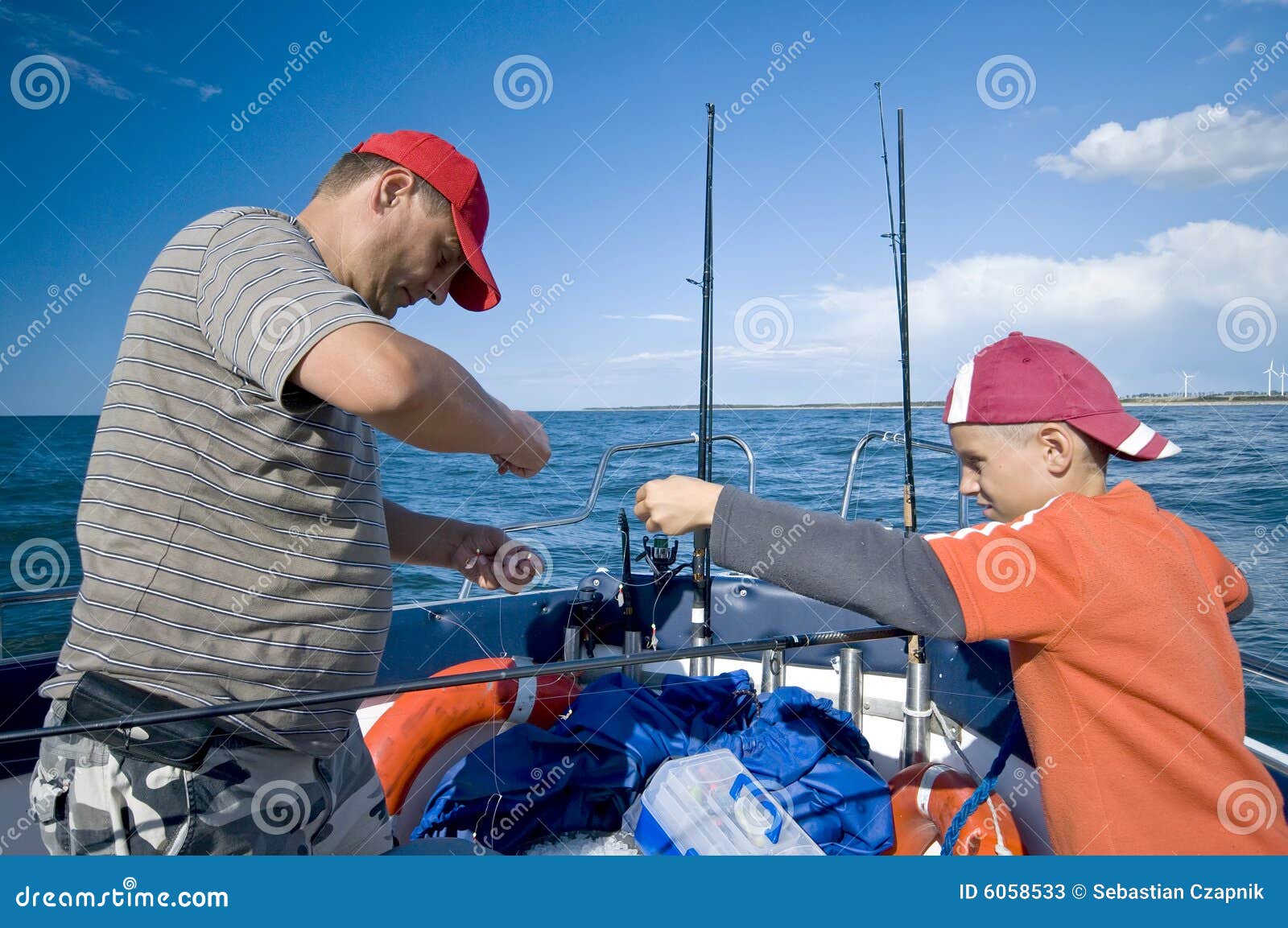 Father and Son Fishing at Sea Stock Image - Image of male, holiday: 6058533