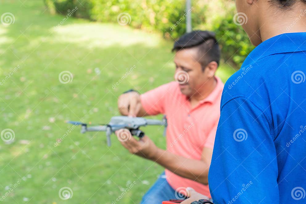 Father with Son Flying Drone in Forest Stock Image - Image of drone ...