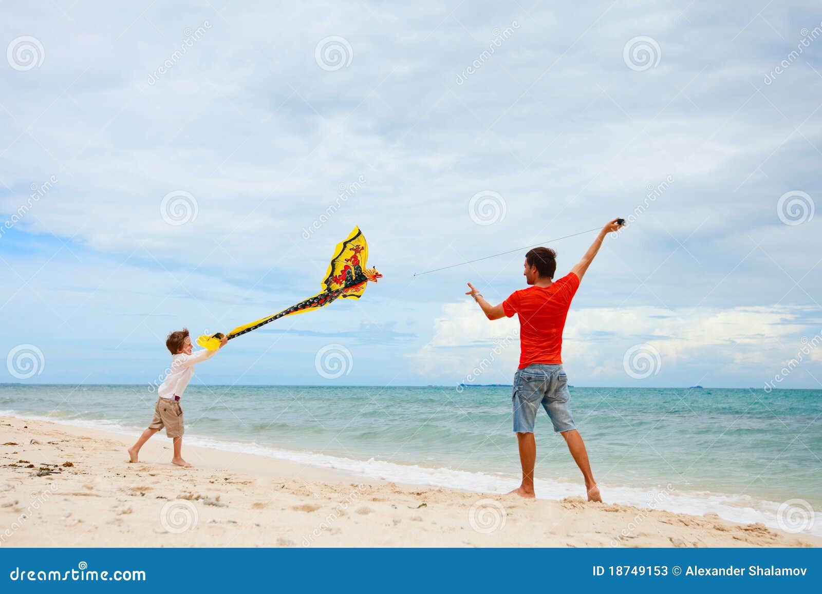 Father and son flying kite stock image. Image of running - 18749153