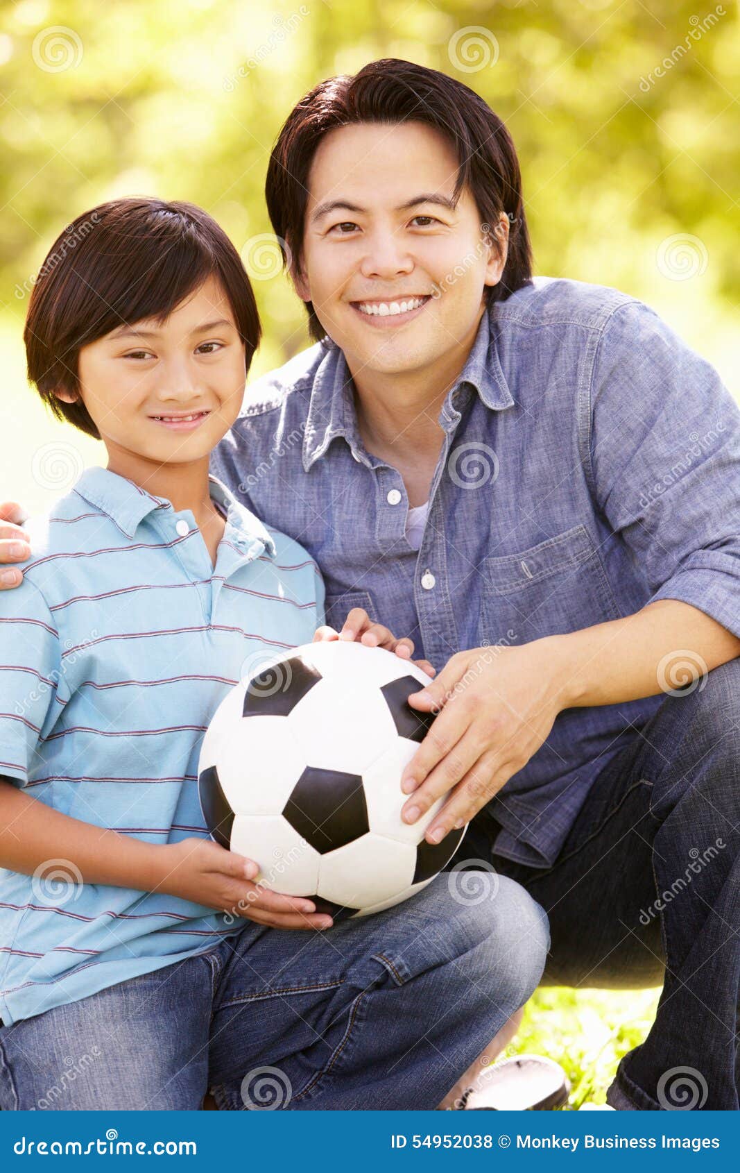 Father and Son with Football Stock Photo - Image of fatherhood ...