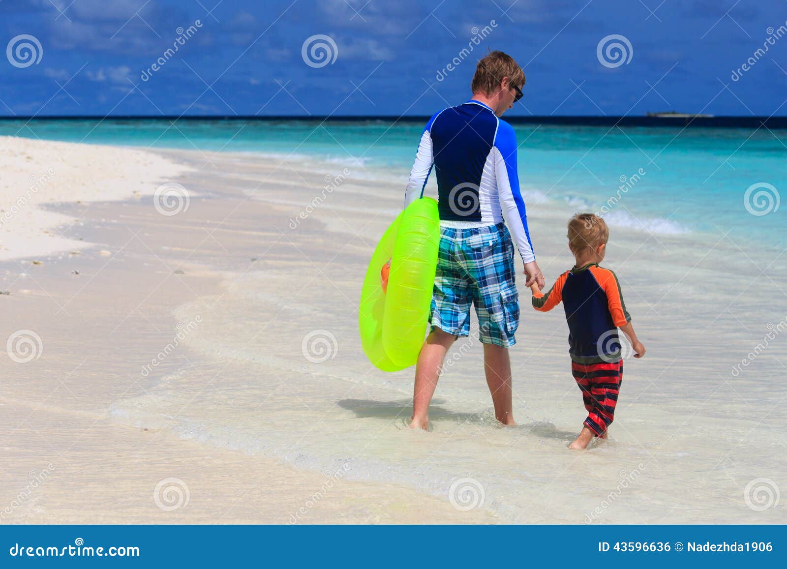 Father and Son Go Swimming at the Beach Stock Photo - Image of swim ...