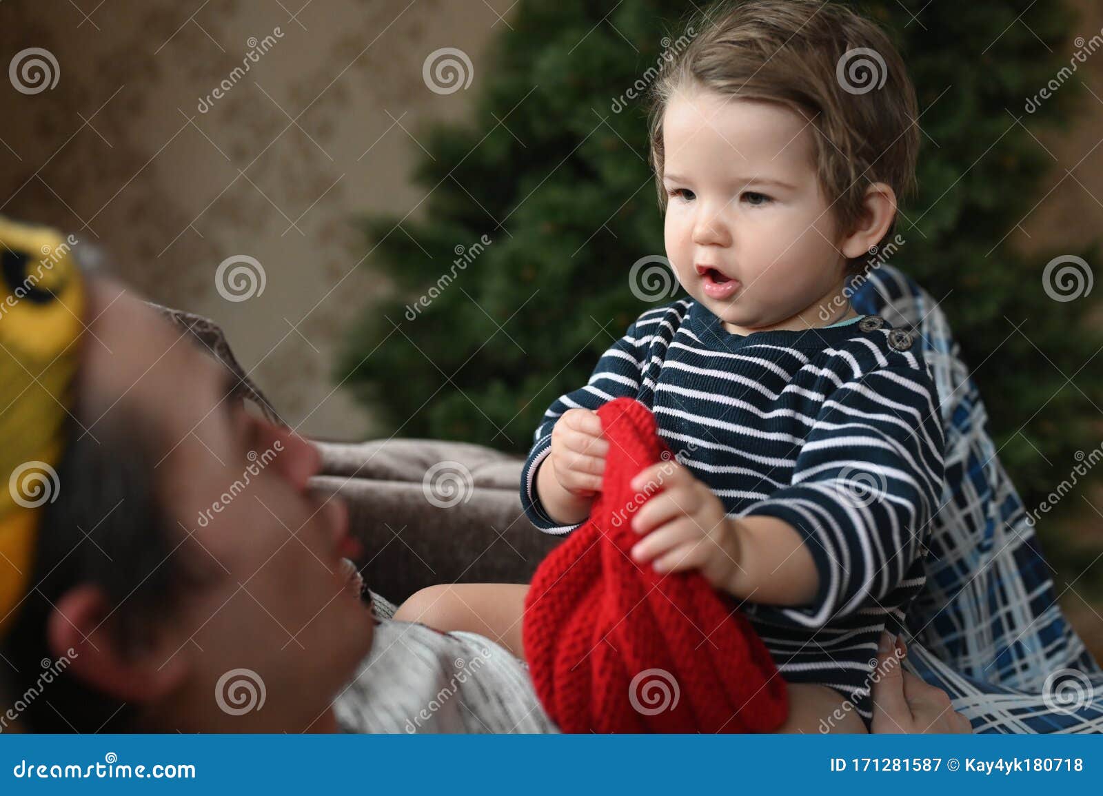 Father and Son Have Fun. Father Alone at Home with a Child Playing ...