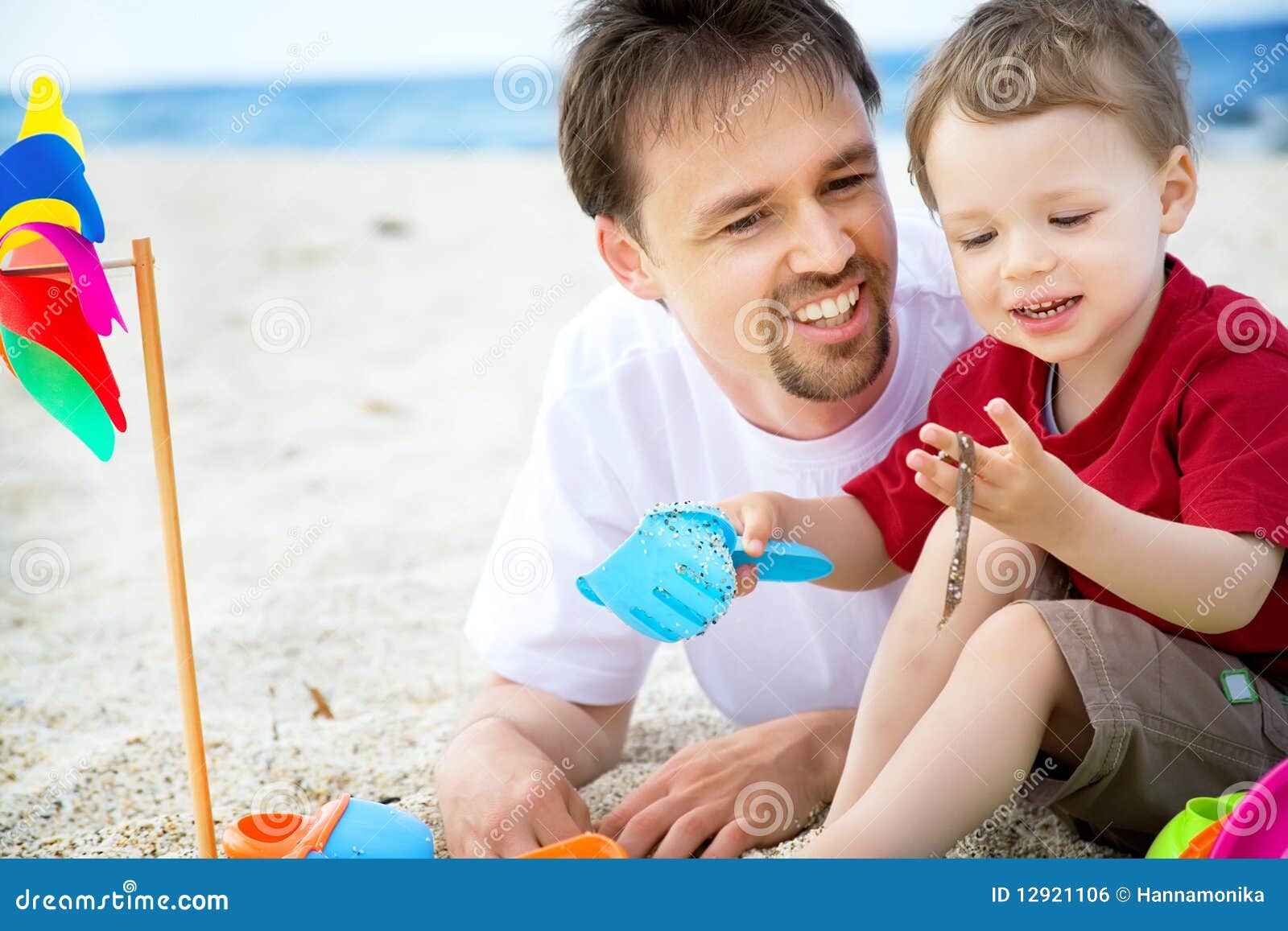 Father and Son Having Fun on the Beach. Stock Photo - Image of ocean ...