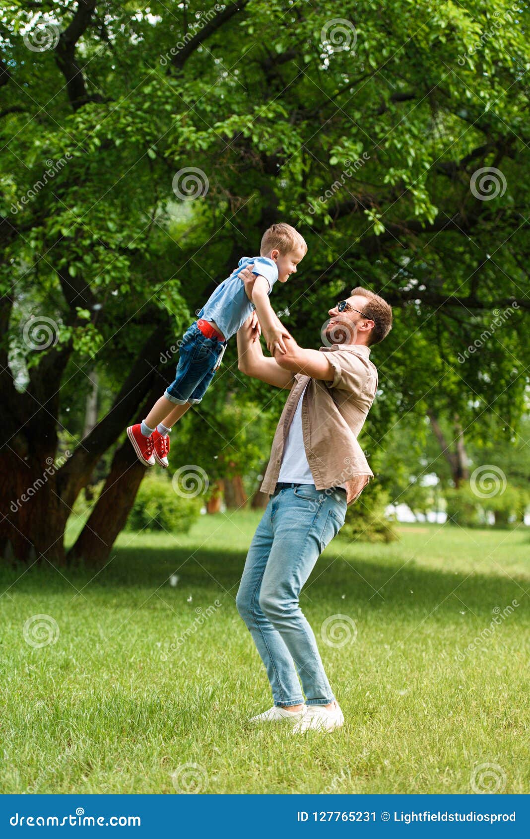 Father and son having fun stock image. Image of outdoors - 127765231