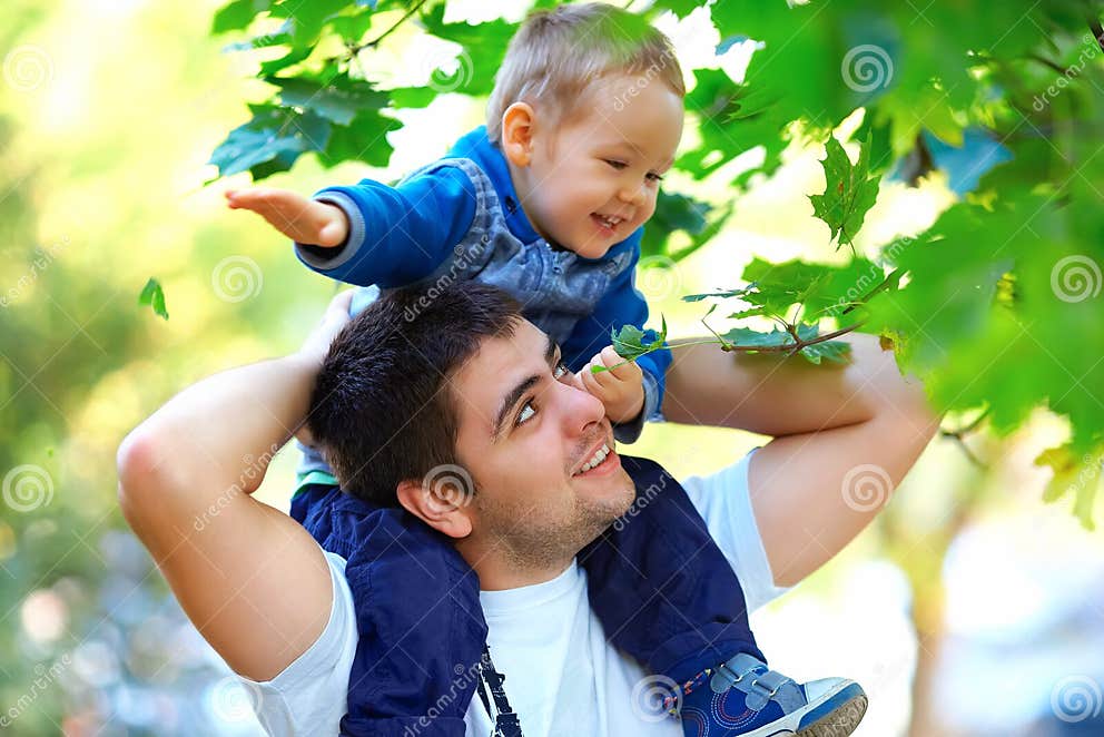 Father and Son Having Fun Playing Outdoors Stock Image - Image of ...