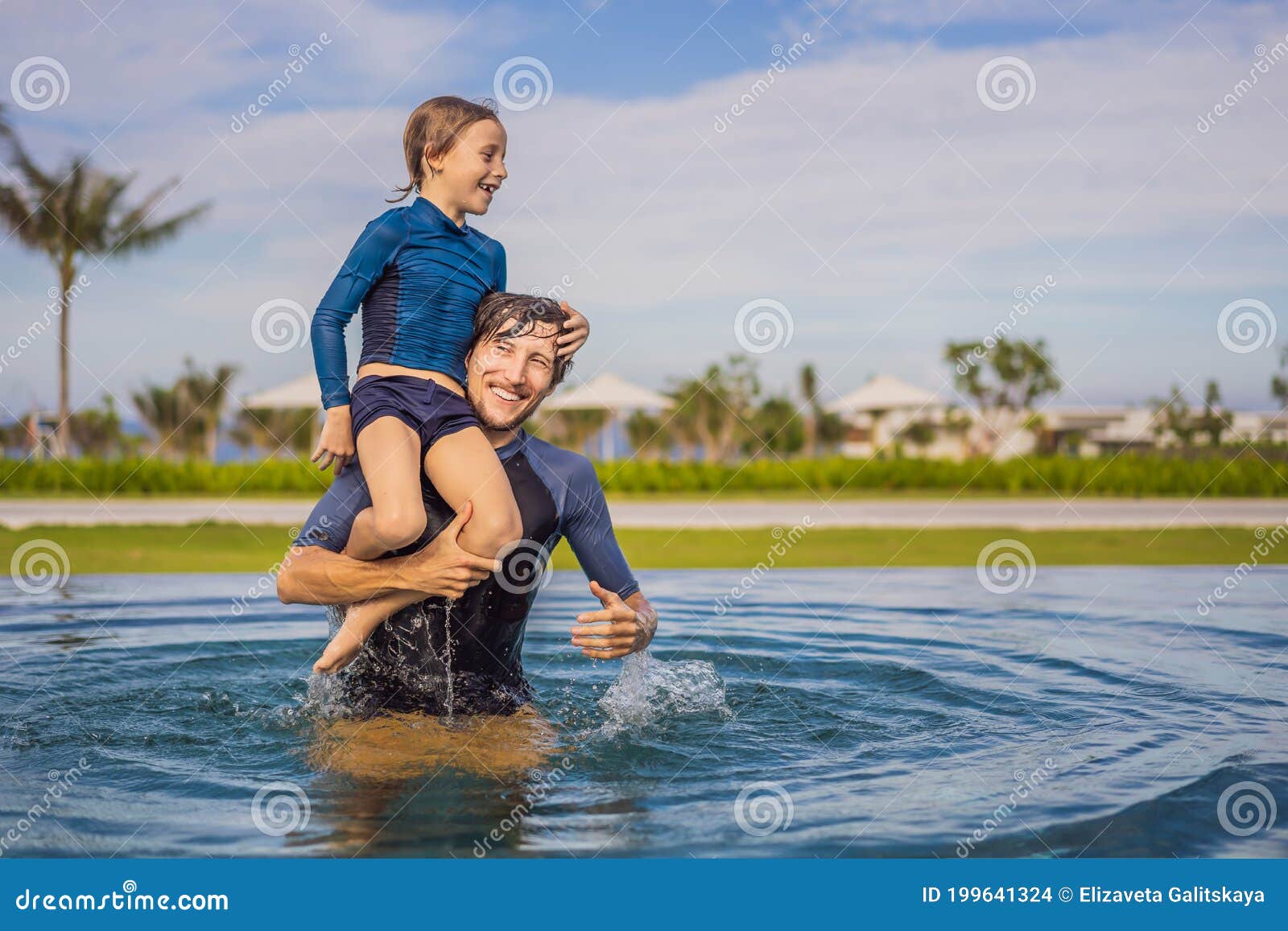 Father and Son Having Fun in the Swimming Pool Stock Photo - Image of ...