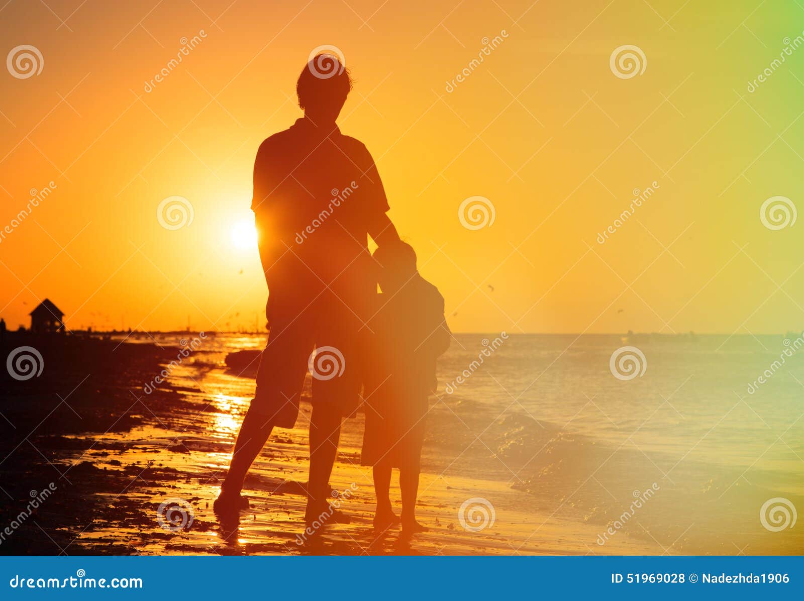 Father and Son Hug at Sunset Stock Photo - Image of leisure, people ...