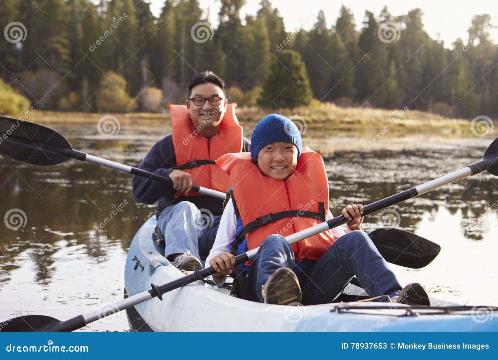 Father and Son Kayaking on a Rural Lake, Front View Stock Image - Image ...