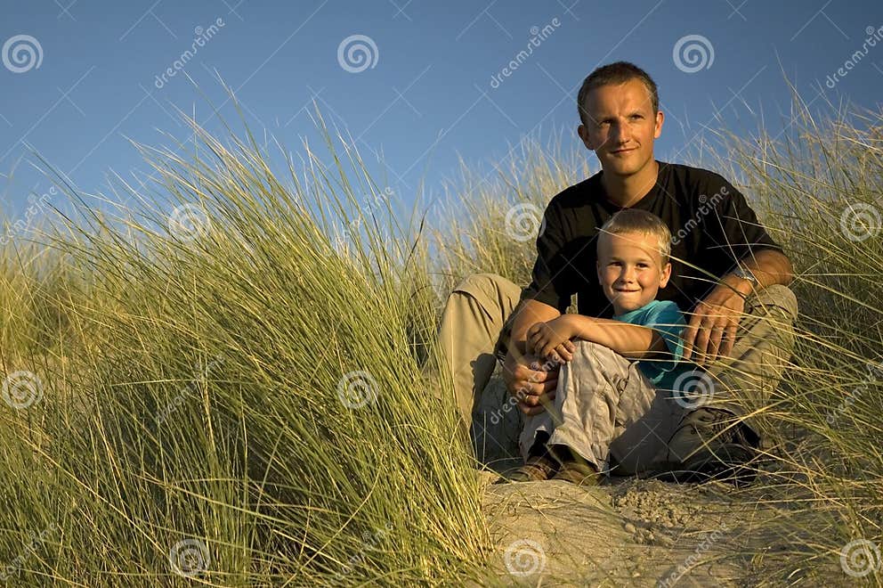 Father and Son Looking Away Stock Image - Image of cosy, gold: 2955039