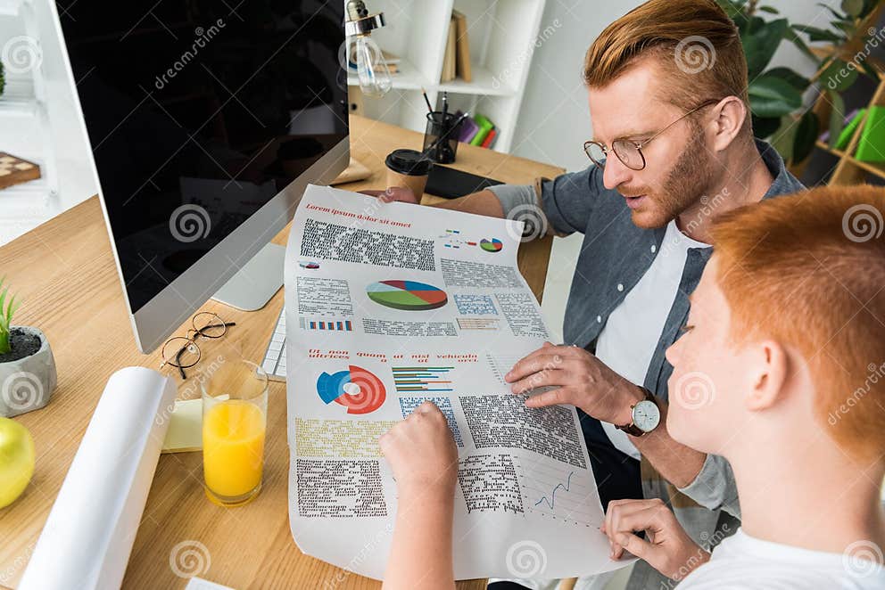 Father and Son Looking at Diagram Stock Photo - Image of copyspace ...