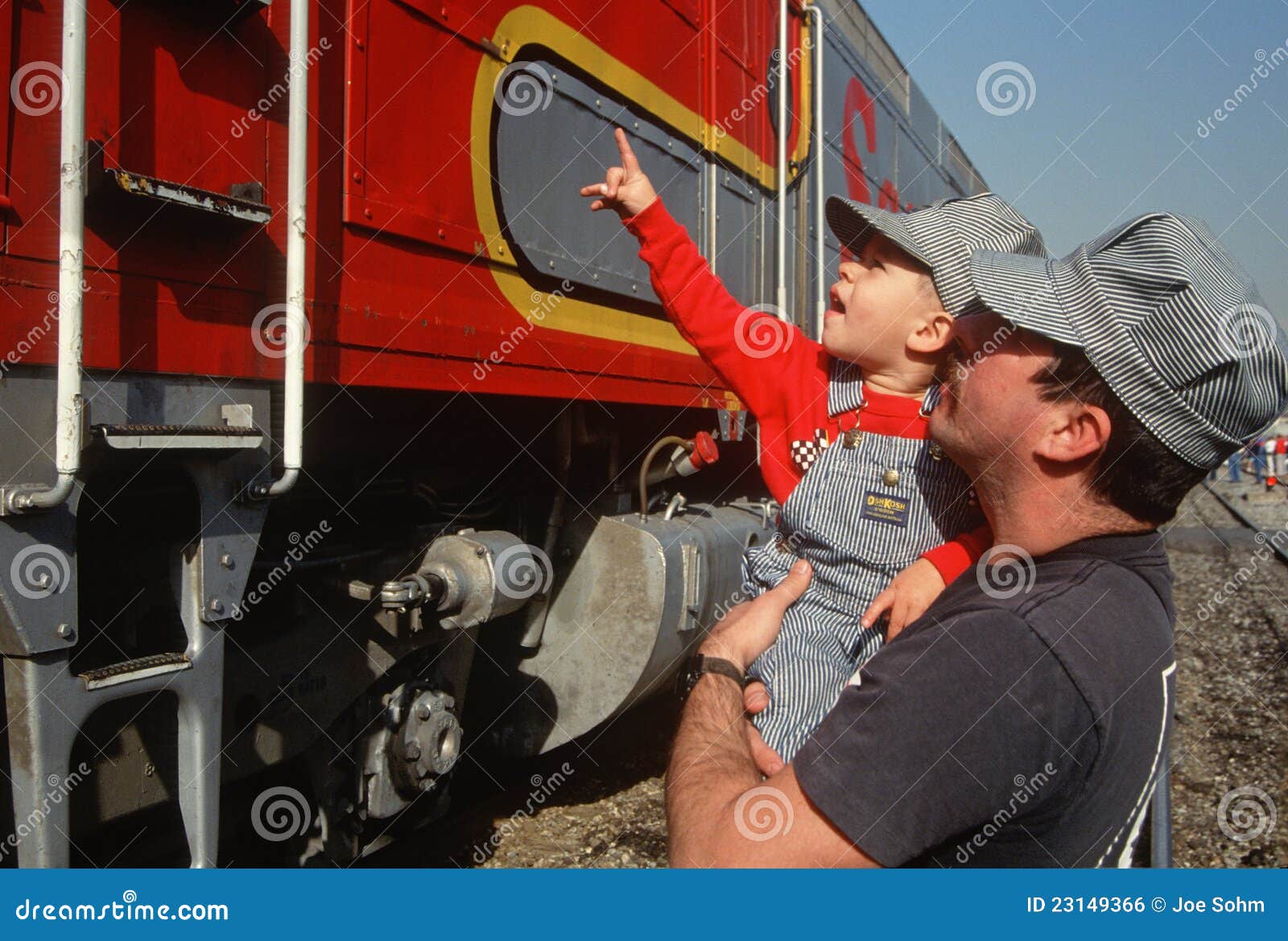 Father and Son Looking at Historic Train Editorial Photo - Image of ...