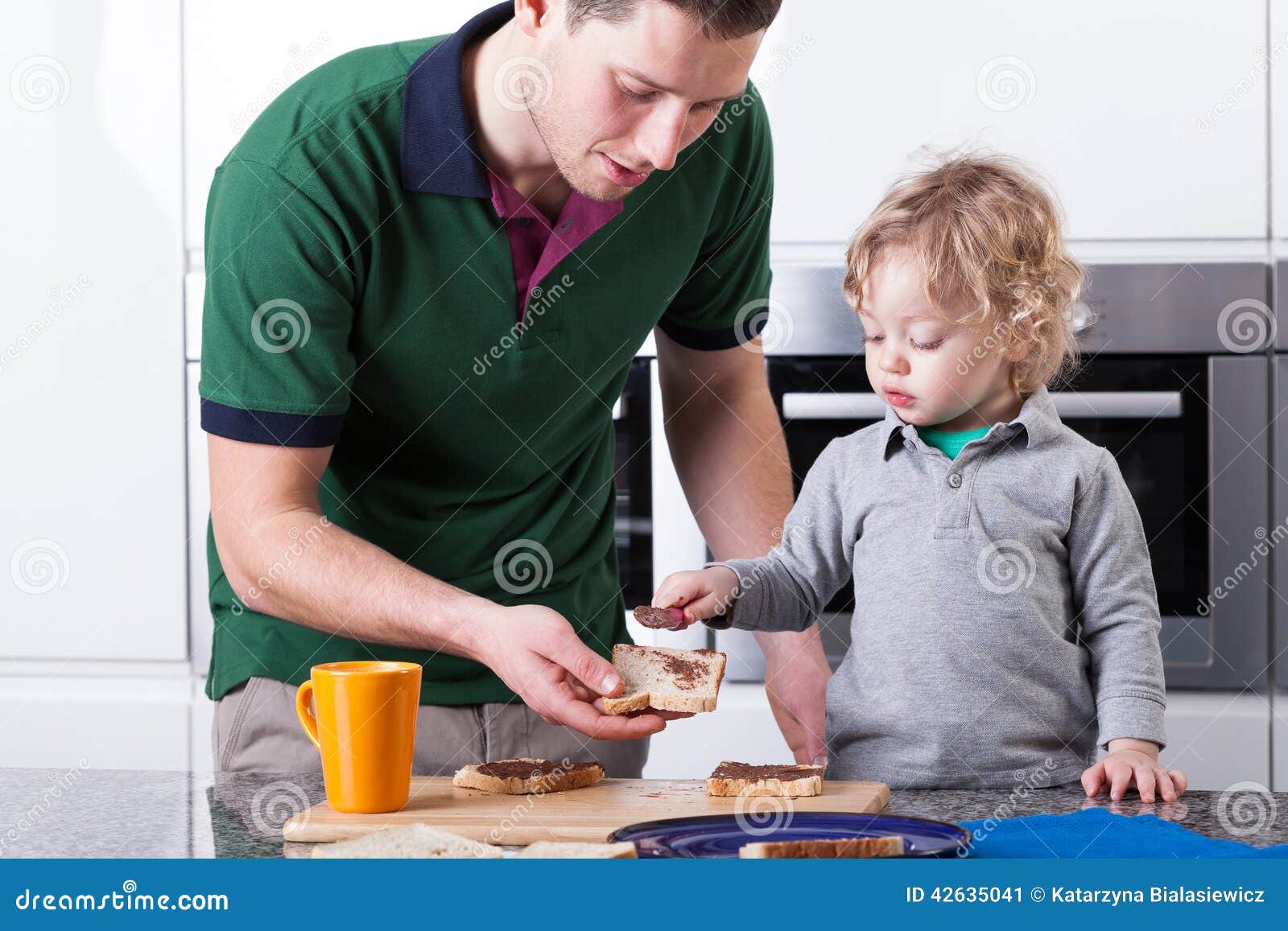 Father and Son Making Breakfast Together Stock Image - Image of meal ...