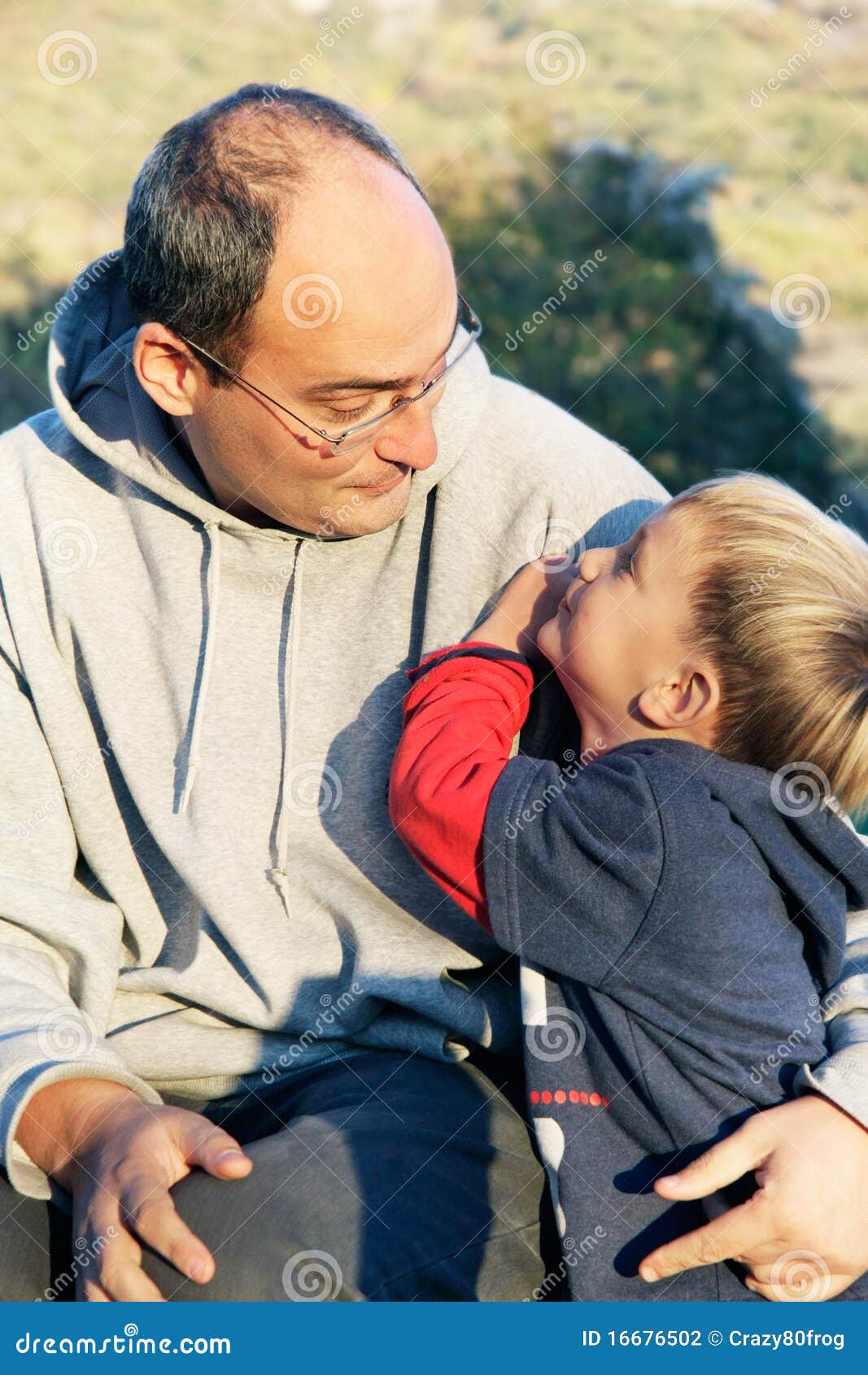 Father And Son On Natural Background Stock Photo - Image of autumn ...