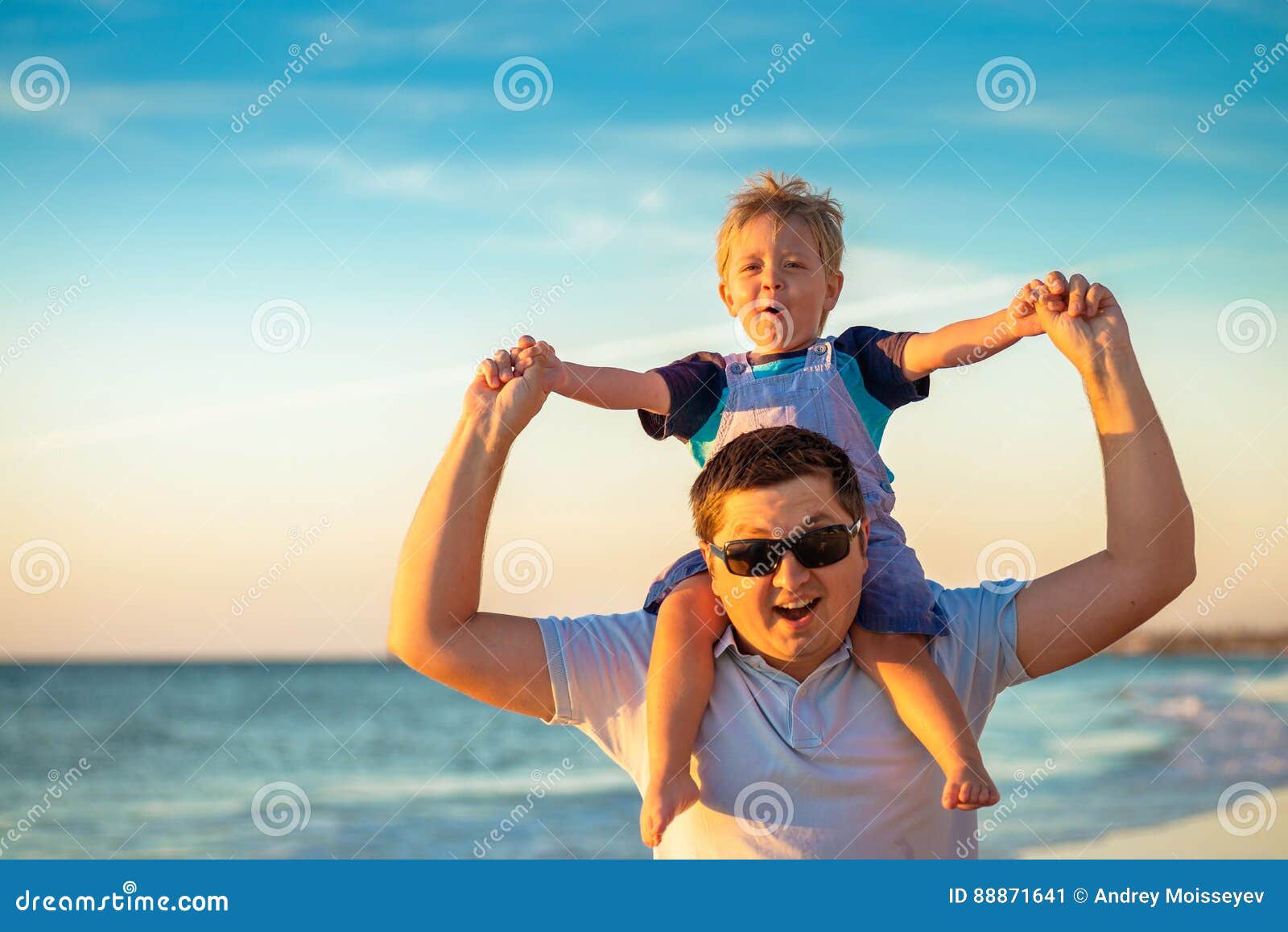Father and son piggyback stock image. Image of ocean - 88871641