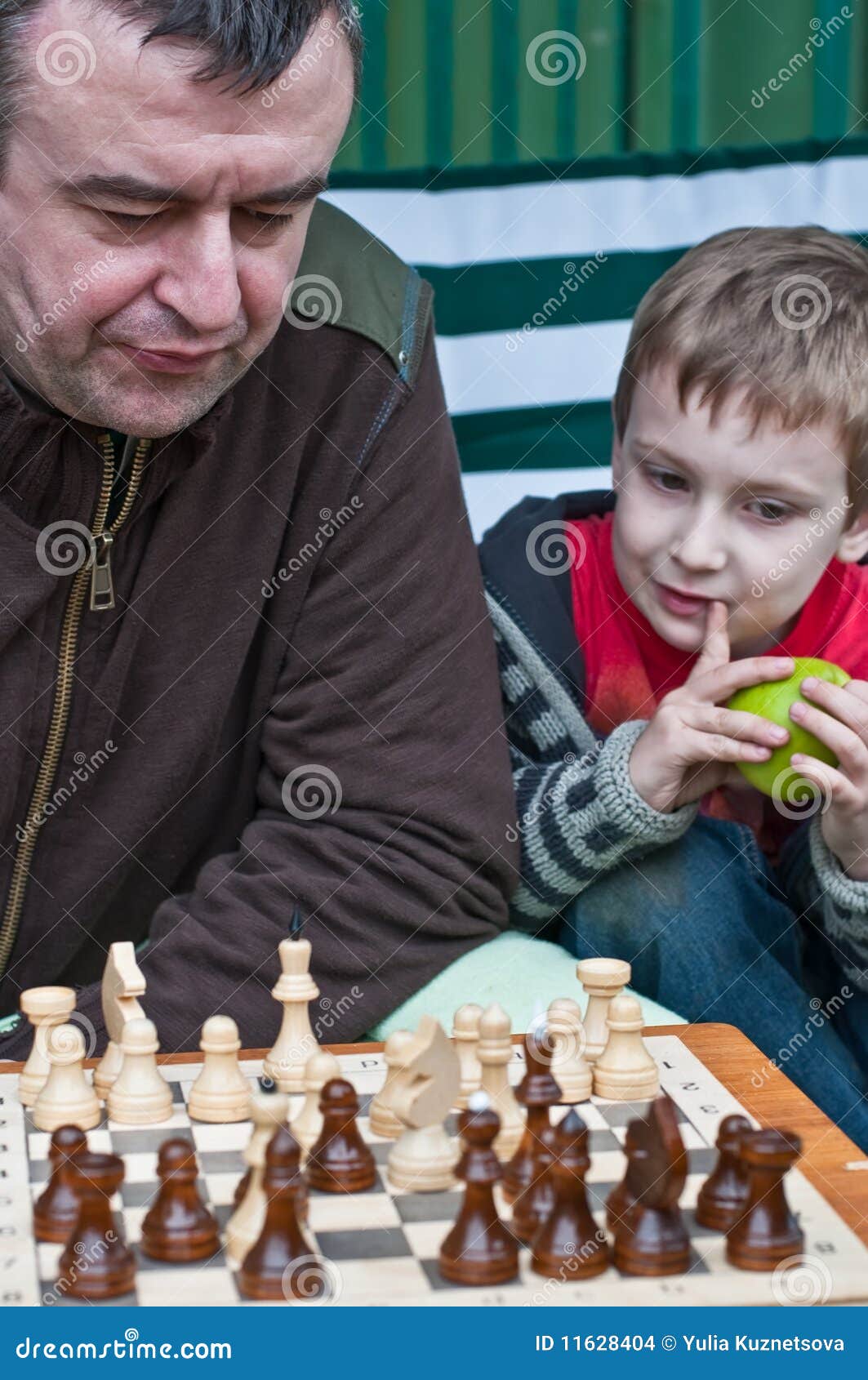 Father and Son Playing Chess Stock Photo - Image of wood, child: 11628404