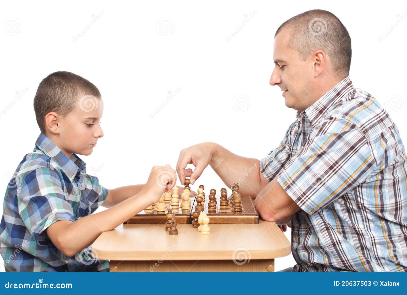 Father And Son Playing Chess Stock Photos - Image: 20637503