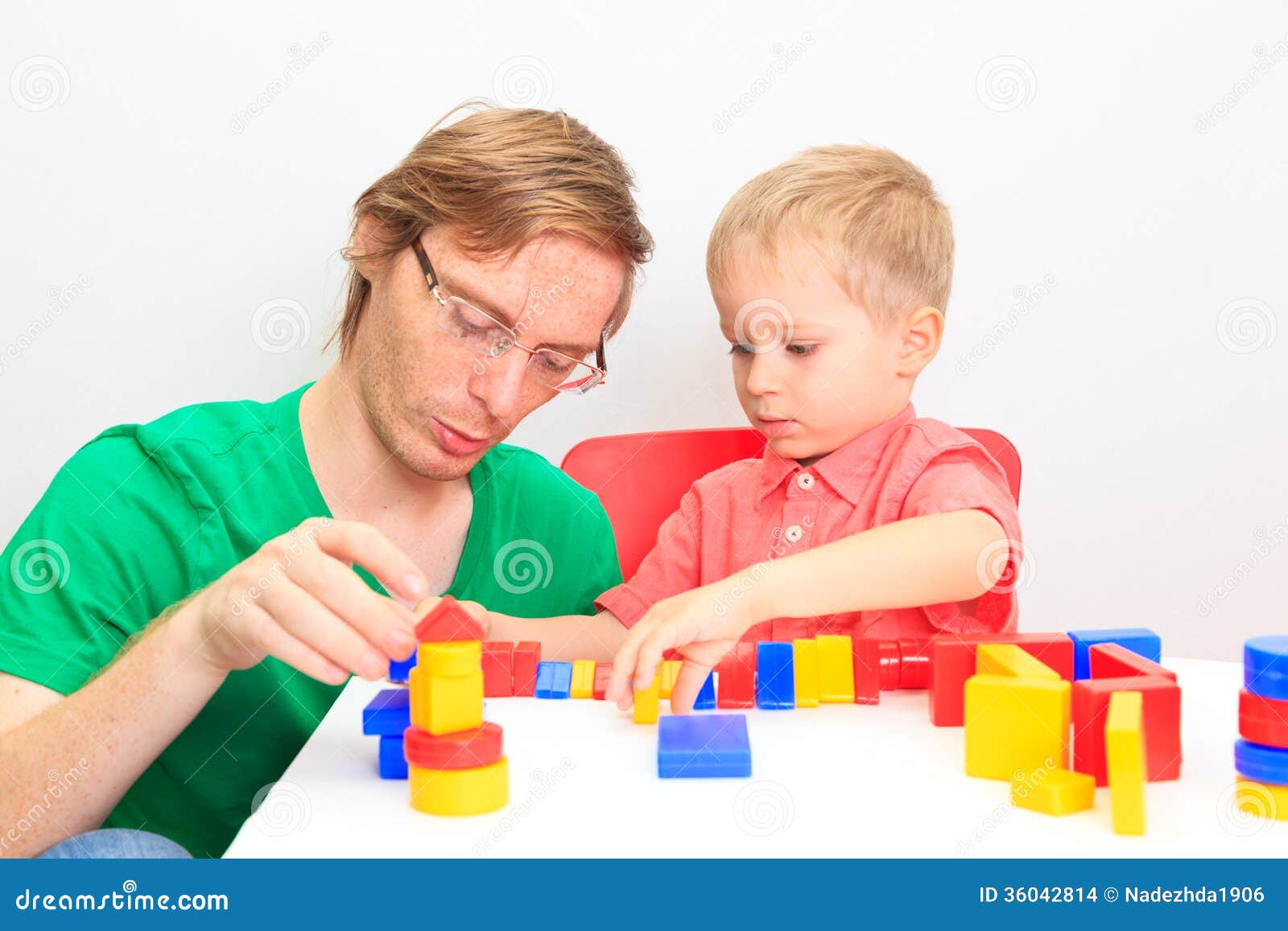 Father and Son Playing with Colorful Blocks Stock Photo - Image of male ...