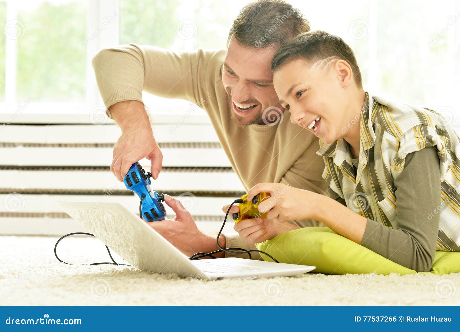 Father and Son Playing Computer Game Stock Photo - Image of smile, love ...