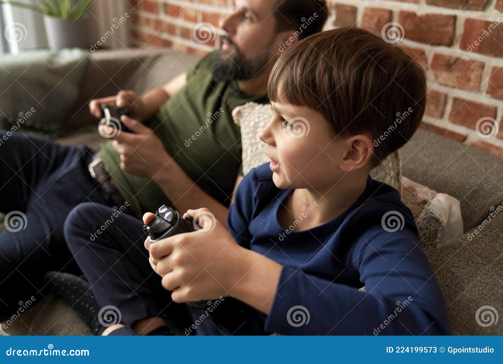 Playing with dad stock image. Image of room, game, gamer - 224199573