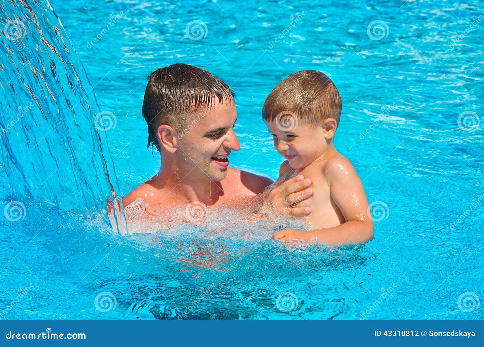 Father and son in the pool stock photo. Image of concepts - 43310812