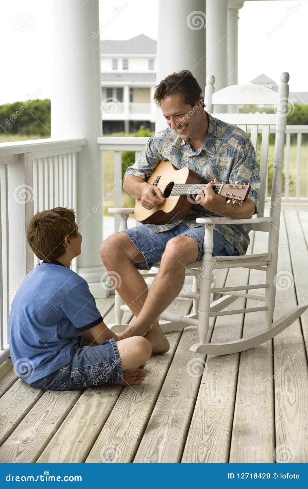Father and Son on Porch stock photo. Image of focus, outdoors - 12718420