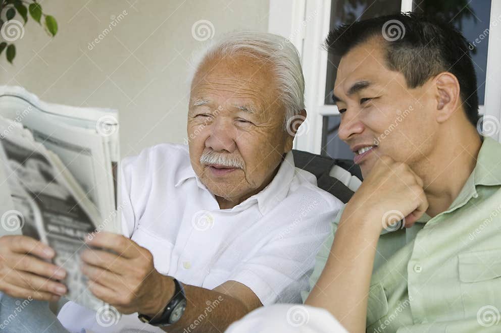 Father and Son Reading Newspaper Stock Image - Image of parent ...