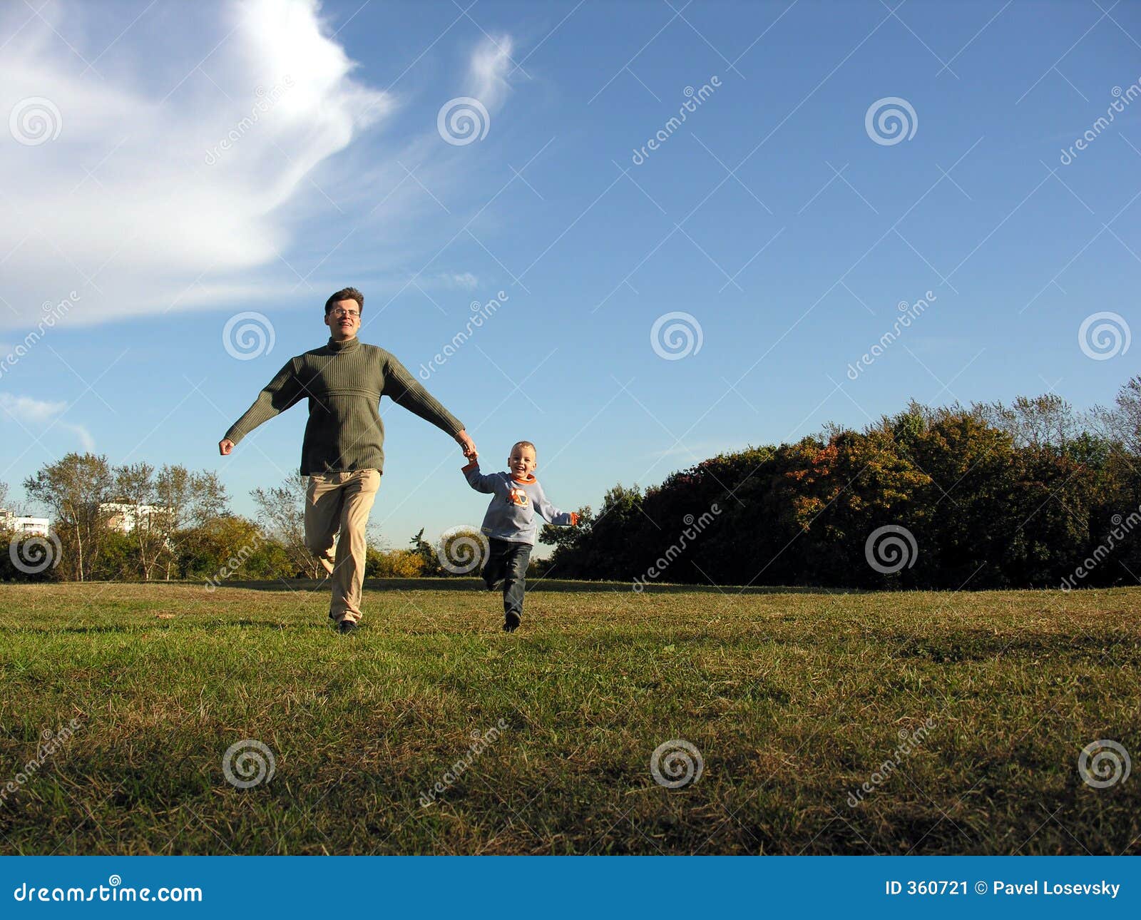 Father with son running stock image. Image of grass, fatherhood - 360721