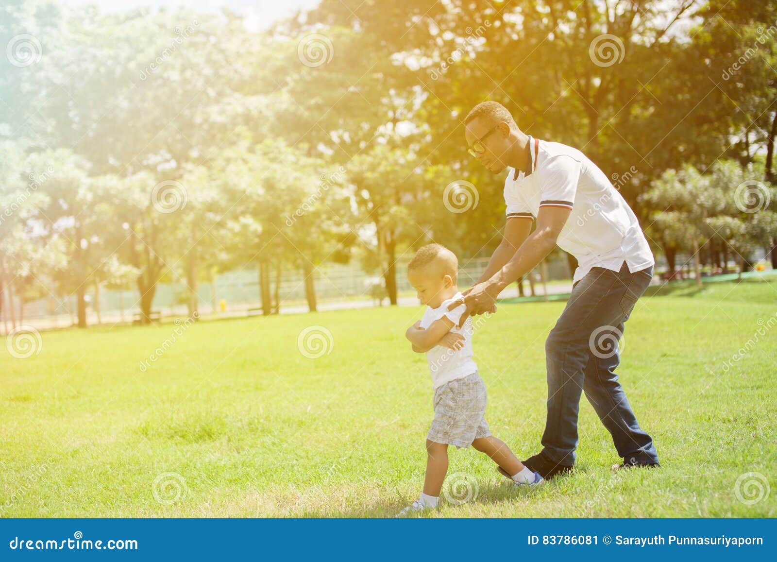 Father and Son Running and Chasing Each Other in Green Park Stock Image ...