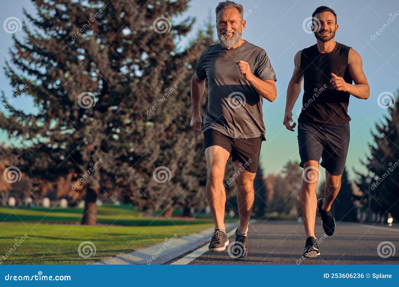 The Father and Son Running on the Road. Stock Photo - Image of athletic ...