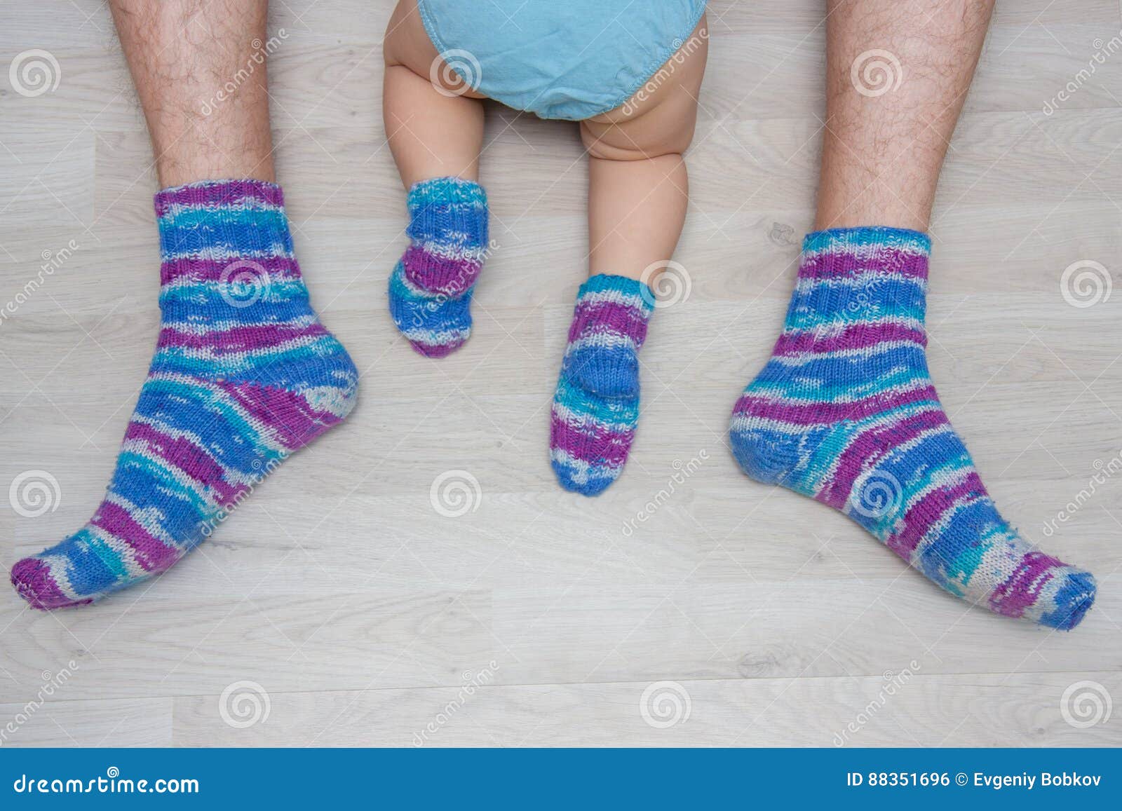 Father and Son in the Same Knitted Socks Stock Photo - Image of ...