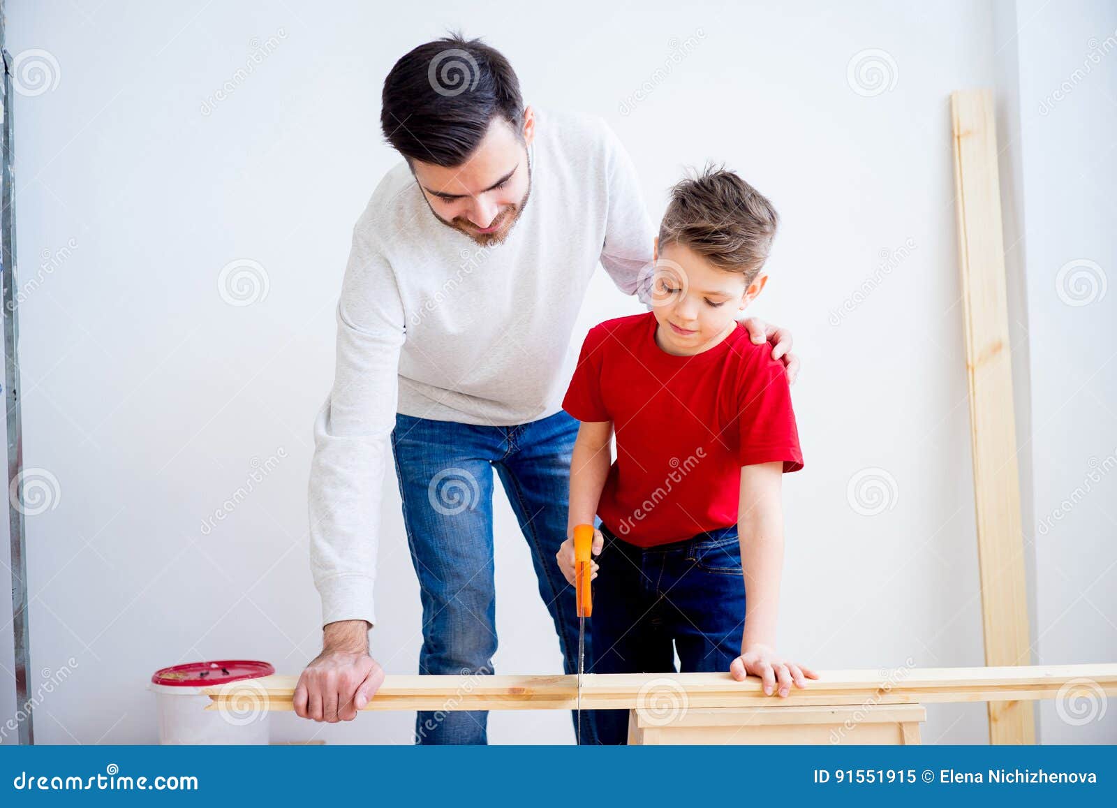 Father and son with saw stock image. Image of male, father - 91551915