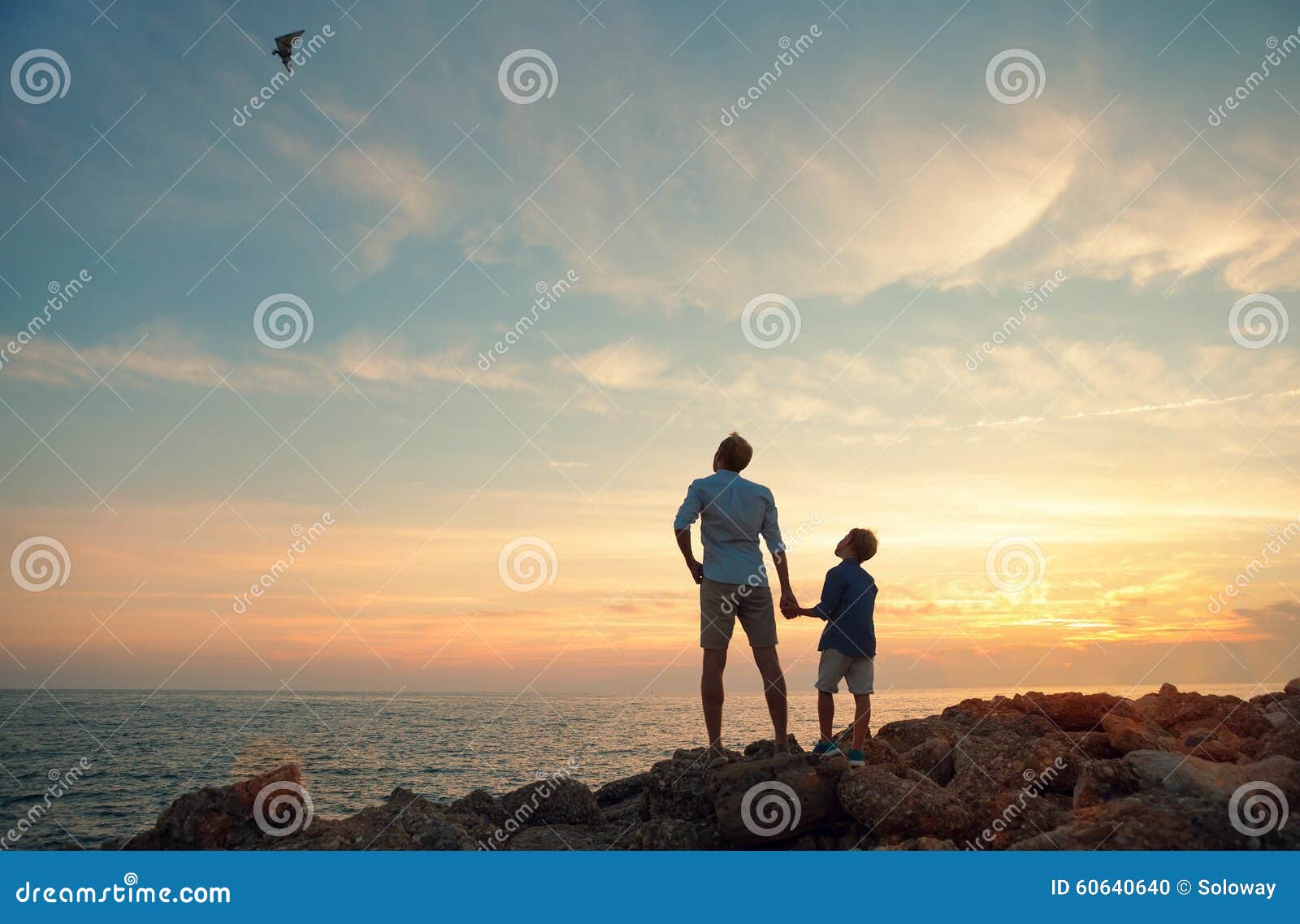 Father with Son on the Sea Coast in Sunset Time Stock Photo - Image of ...
