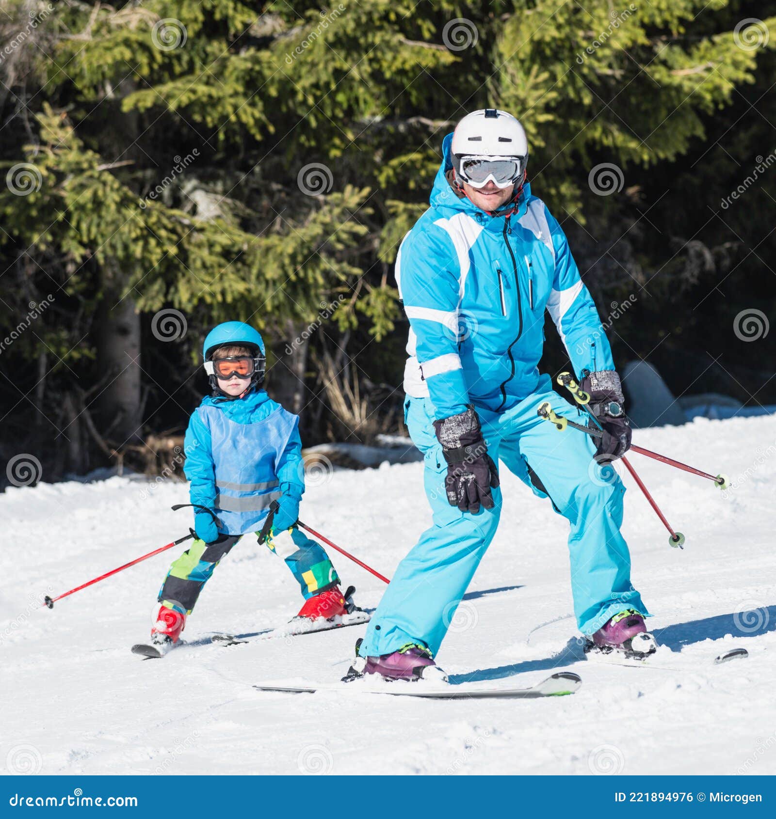 Father and son skiing stock photo. Image of hill, little - 221894976