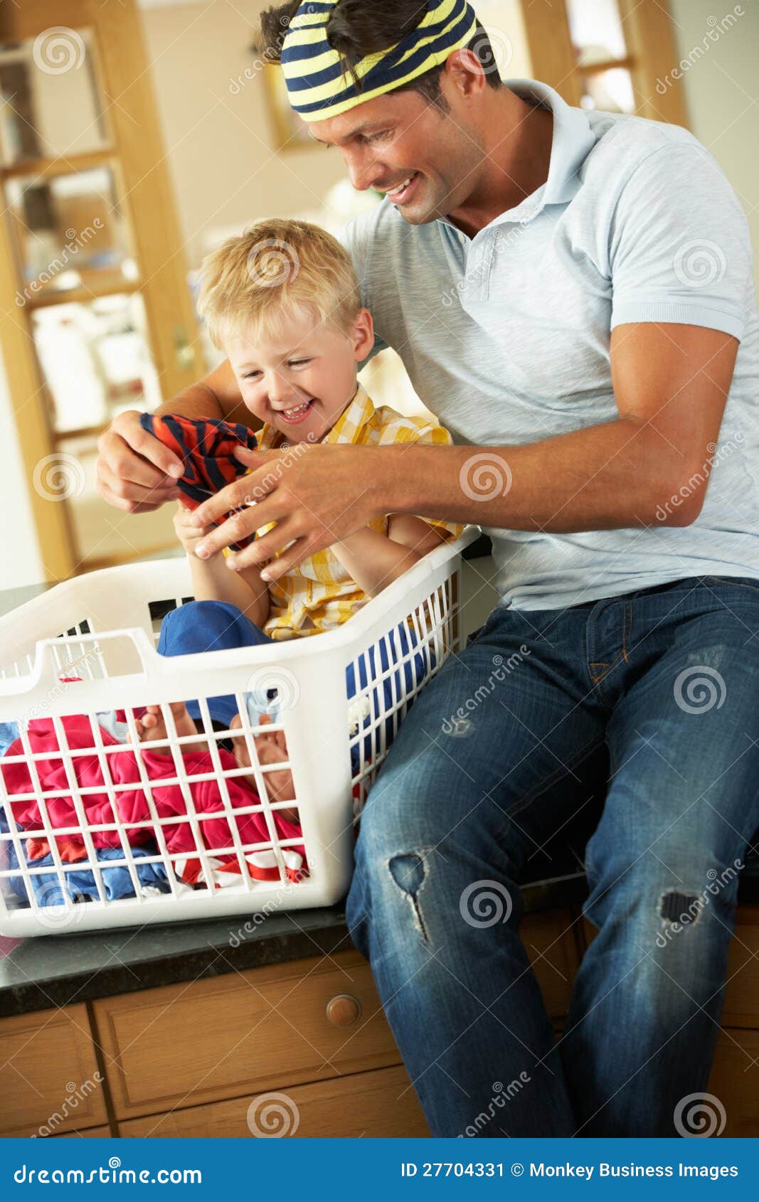 Father and Son Sorting Laundry Stock Image - Image of funny, family ...