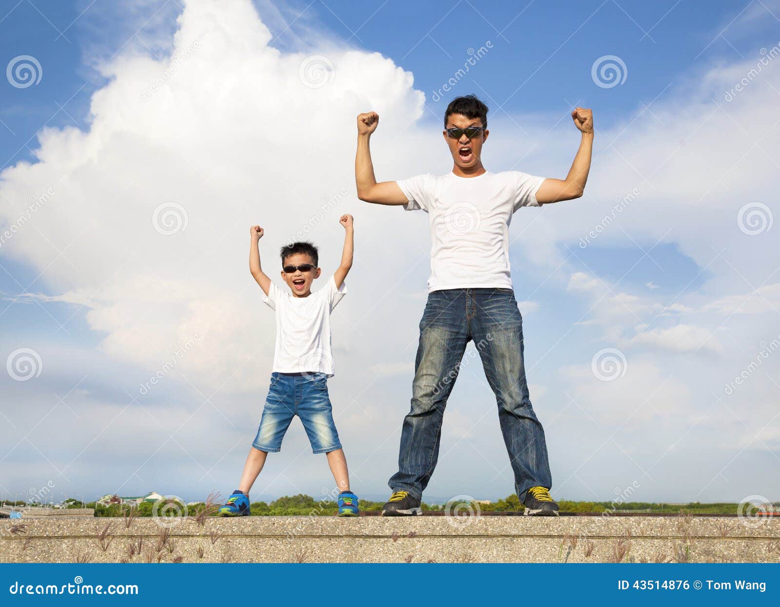 Father and Son Standing and Raising Hands Stock Photo - Image of person ...