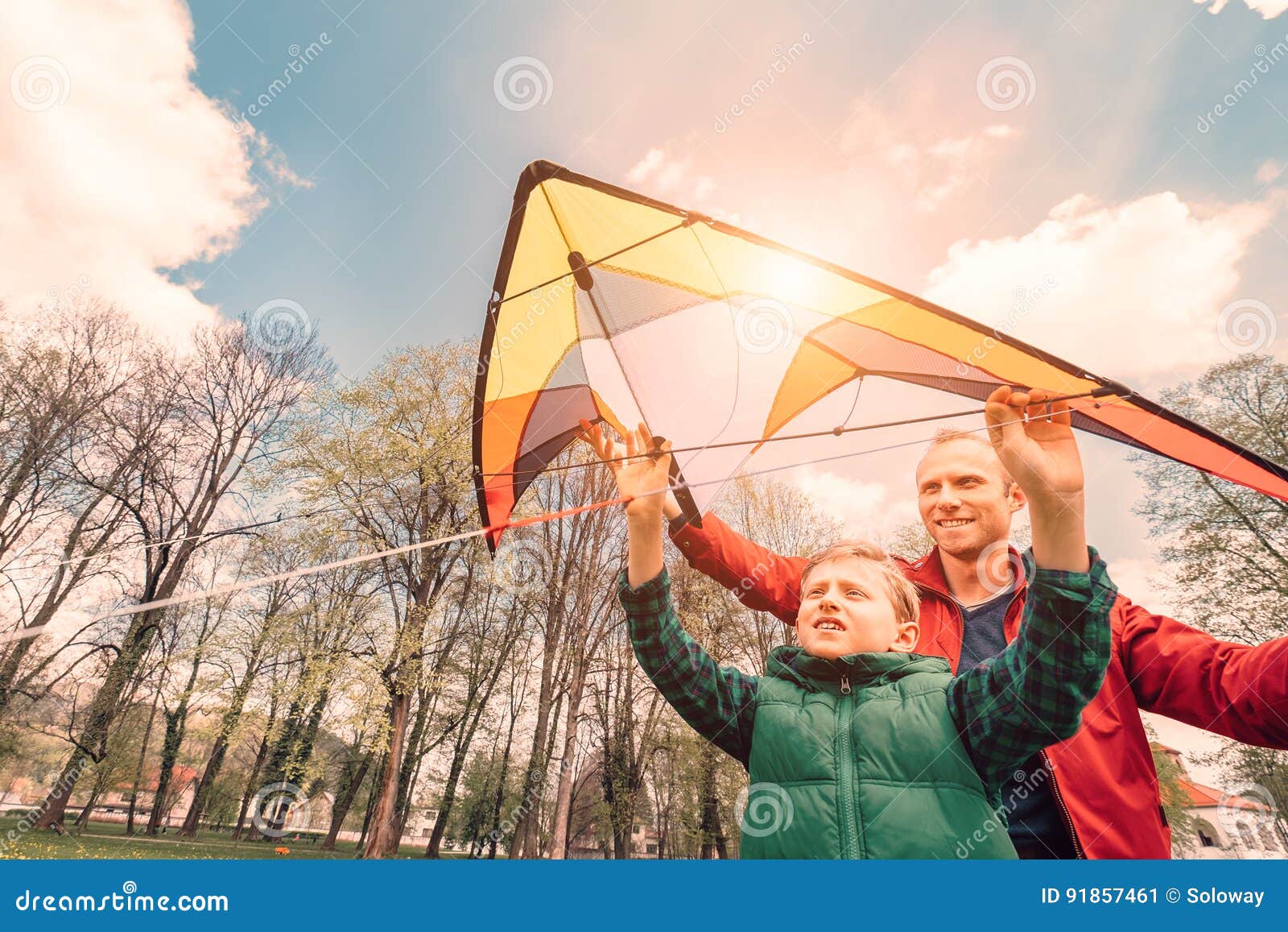 Father and Son Start To Fly a Kite in Sky Stock Image - Image of ...