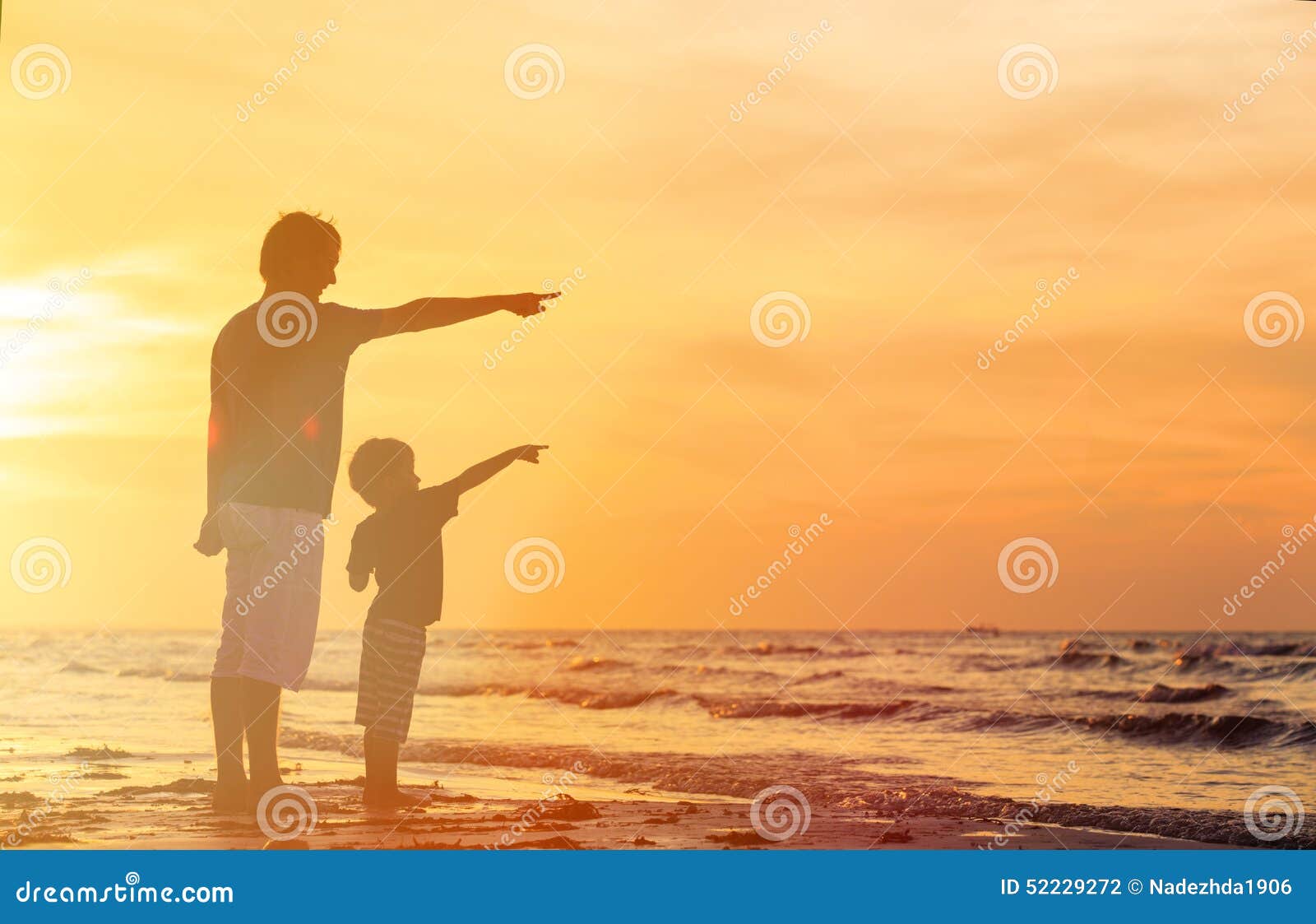 Father and Son at Sunset Beach Stock Photo - Image of beach, idyllic ...