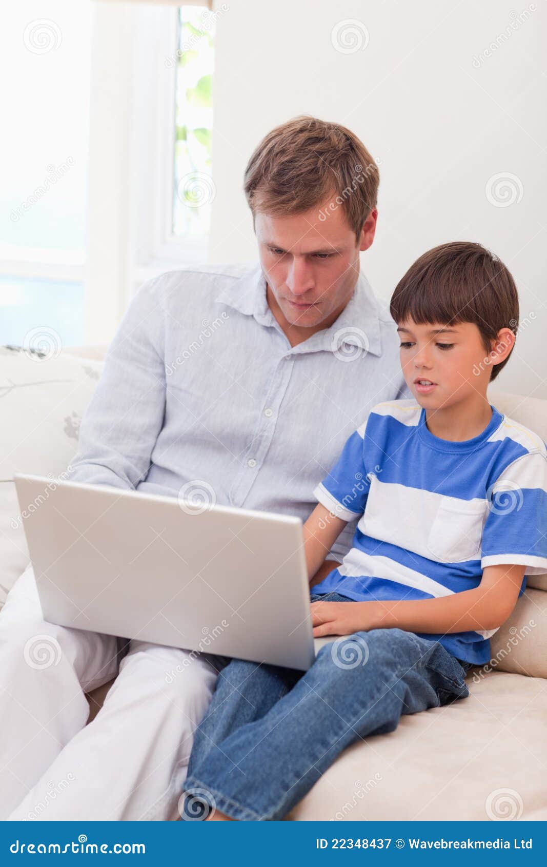 Father and Son Surfing the Internet Together Stock Image - Image of ...