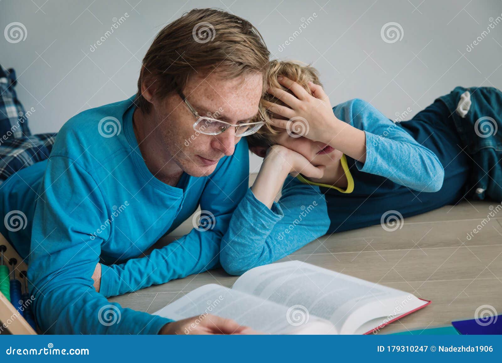 Father and Son Tired of Doing Homework Together Stock Image - Image of ...