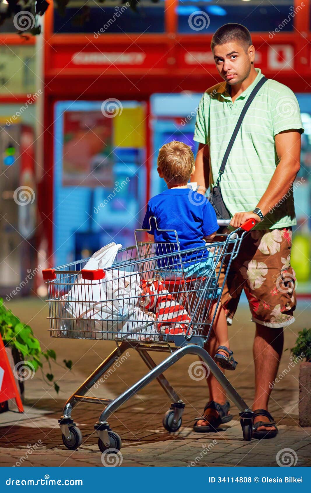 Father and Son with Trolley after Shopping Stock Photo - Image of night ...