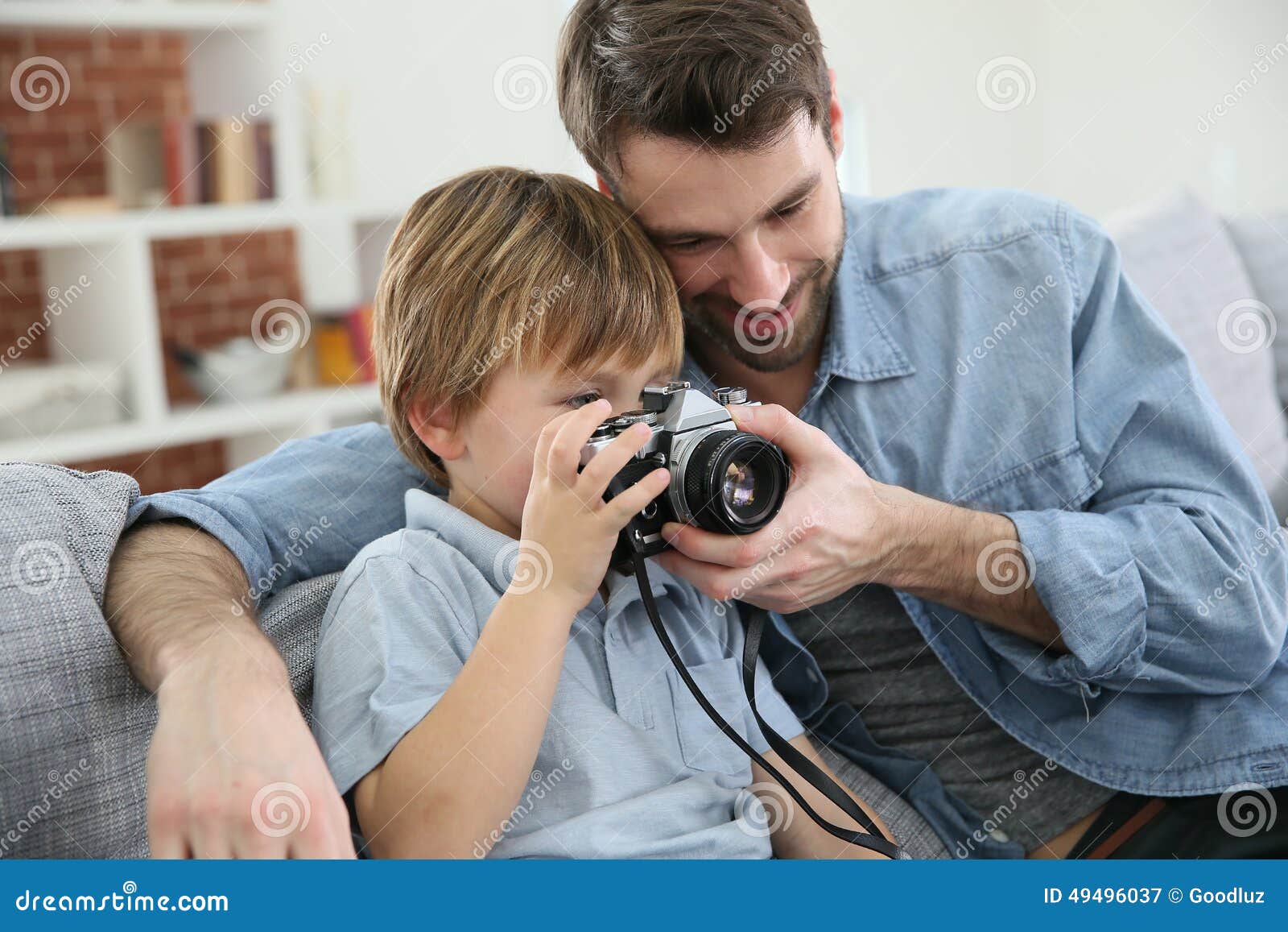 Father and Son Using a Camera Stock Image - Image of home, vintage ...