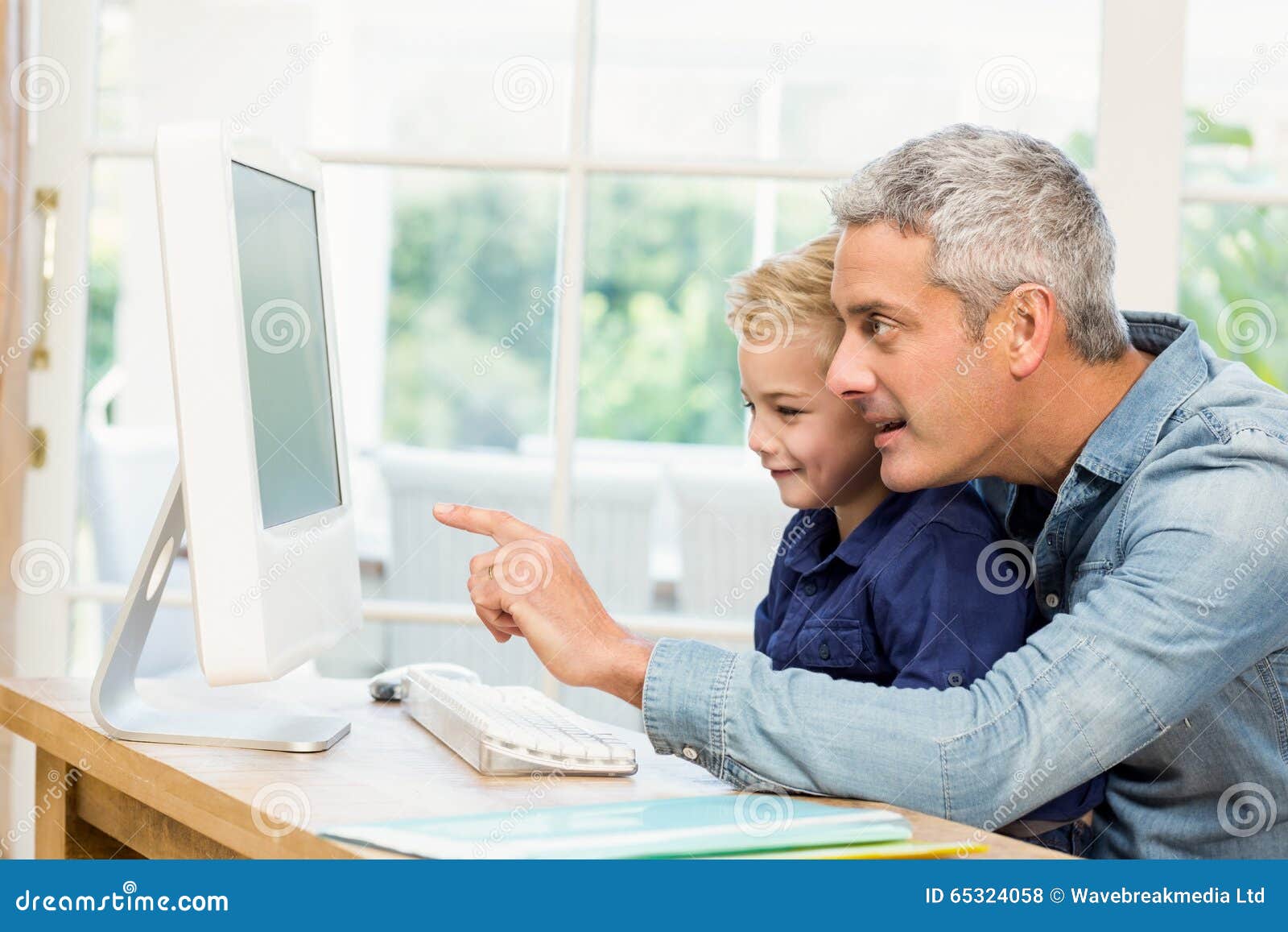 Father and Son Using the Computer Stock Photo - Image of fair ...