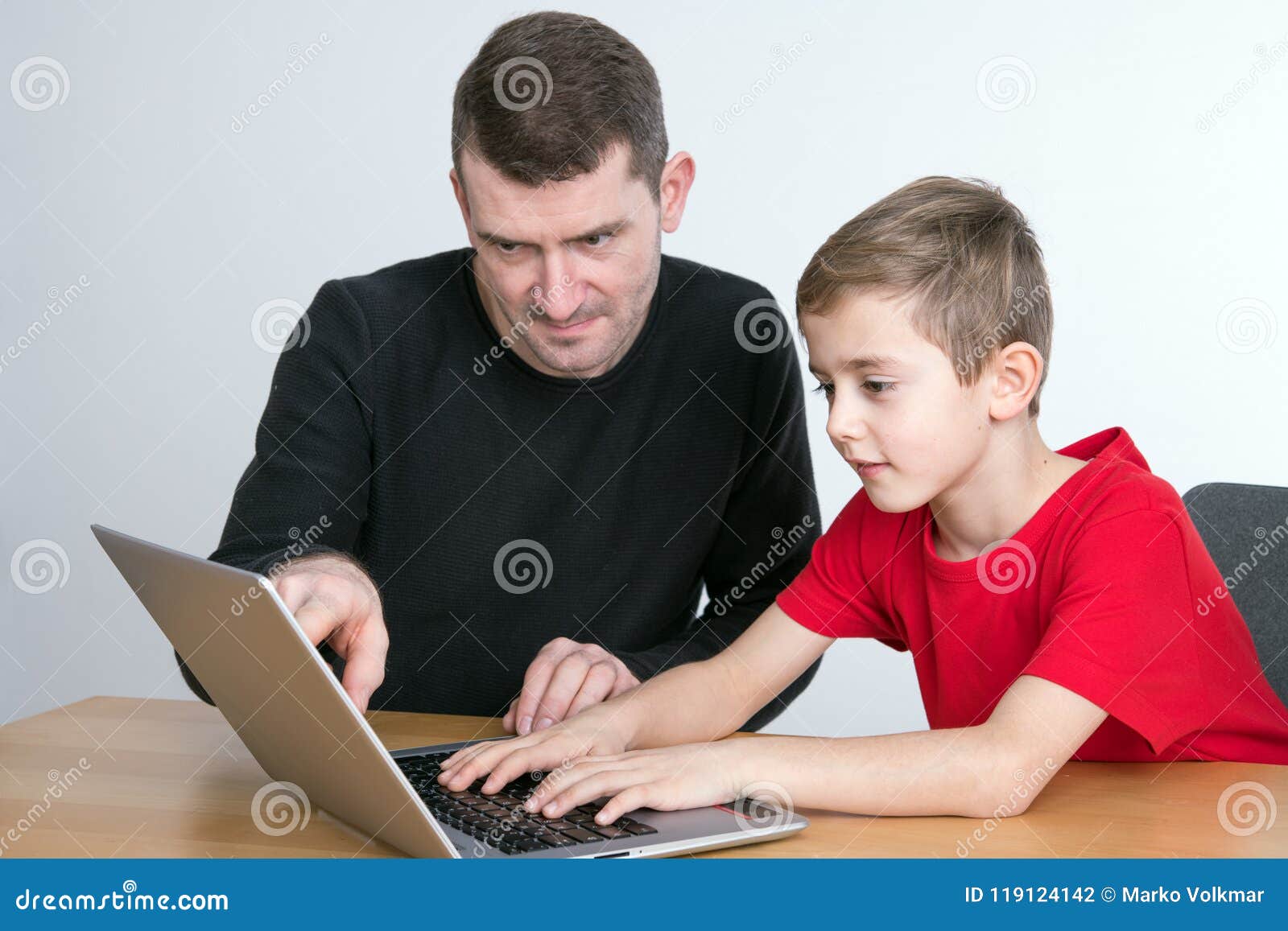 Father and Son Using Computer Together Stock Photo - Image of male ...