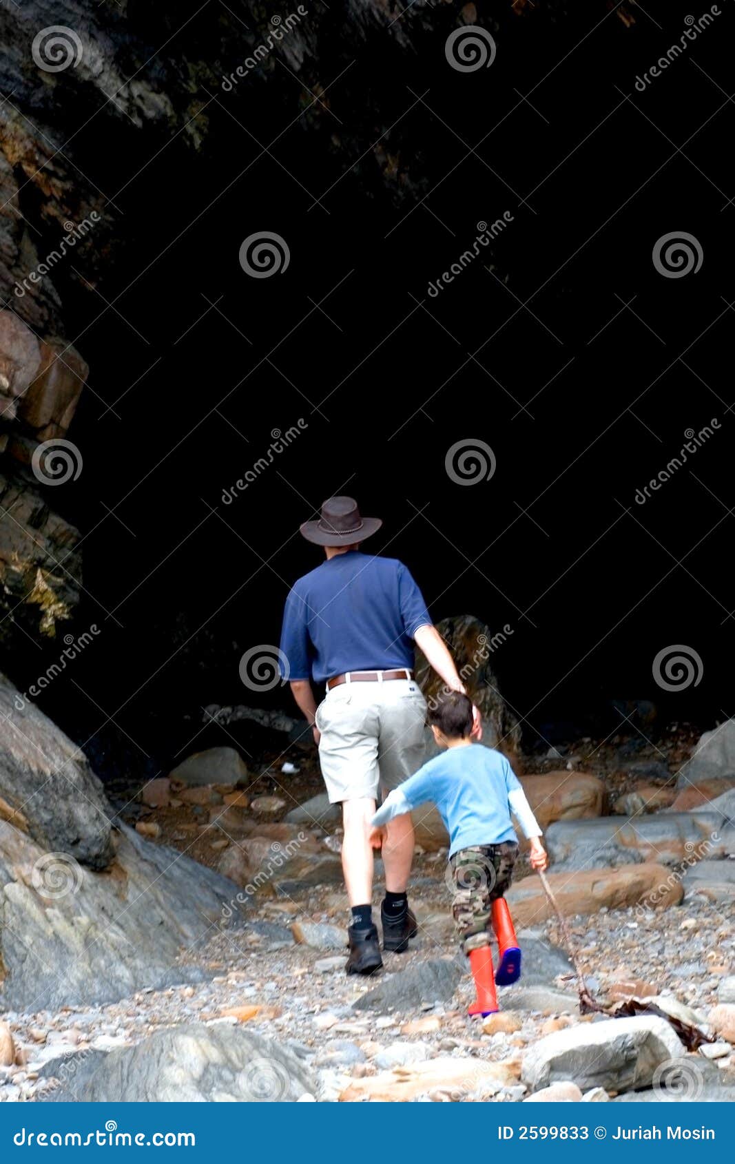 Father and Son Walk into Cave Stock Image - Image of freshness ...