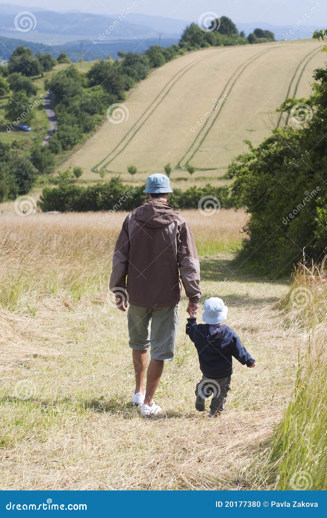 Father and son walking stock photo. Image of outdoors - 20177380