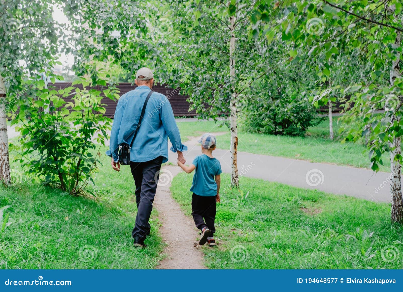 Father and Son Walking in the Park. Stock Image - Image of people ...