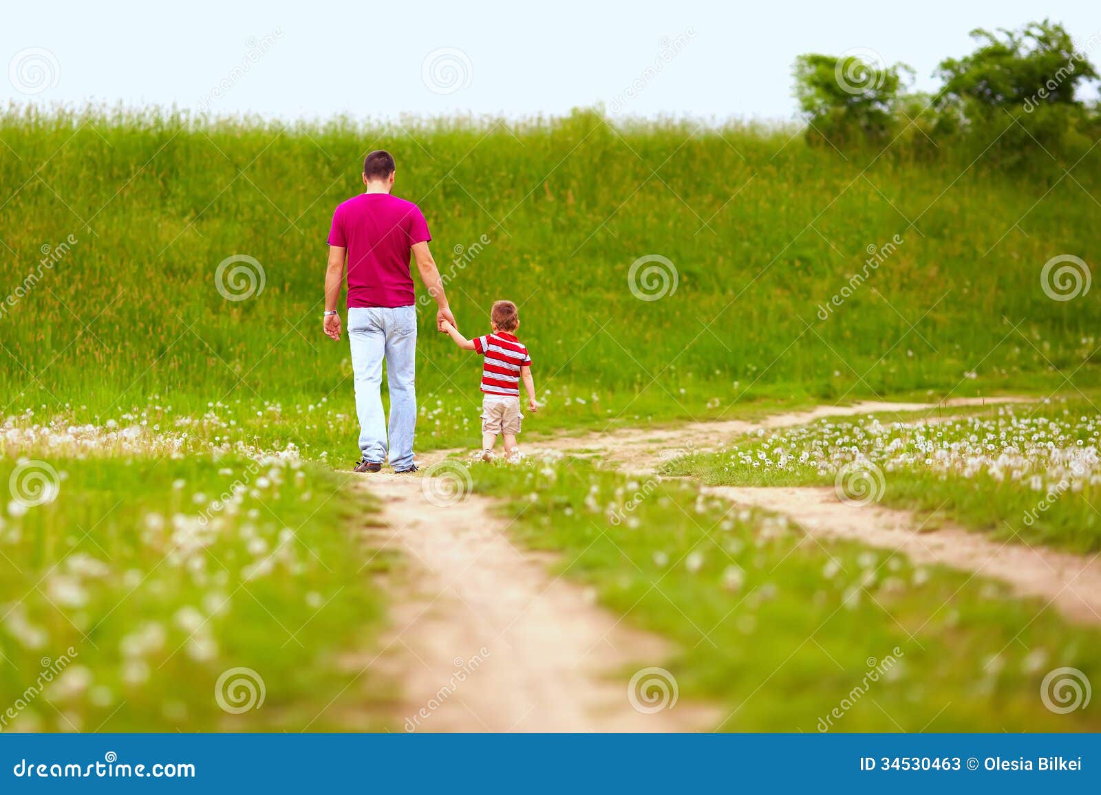 Father And Son Walking Away From Each Other